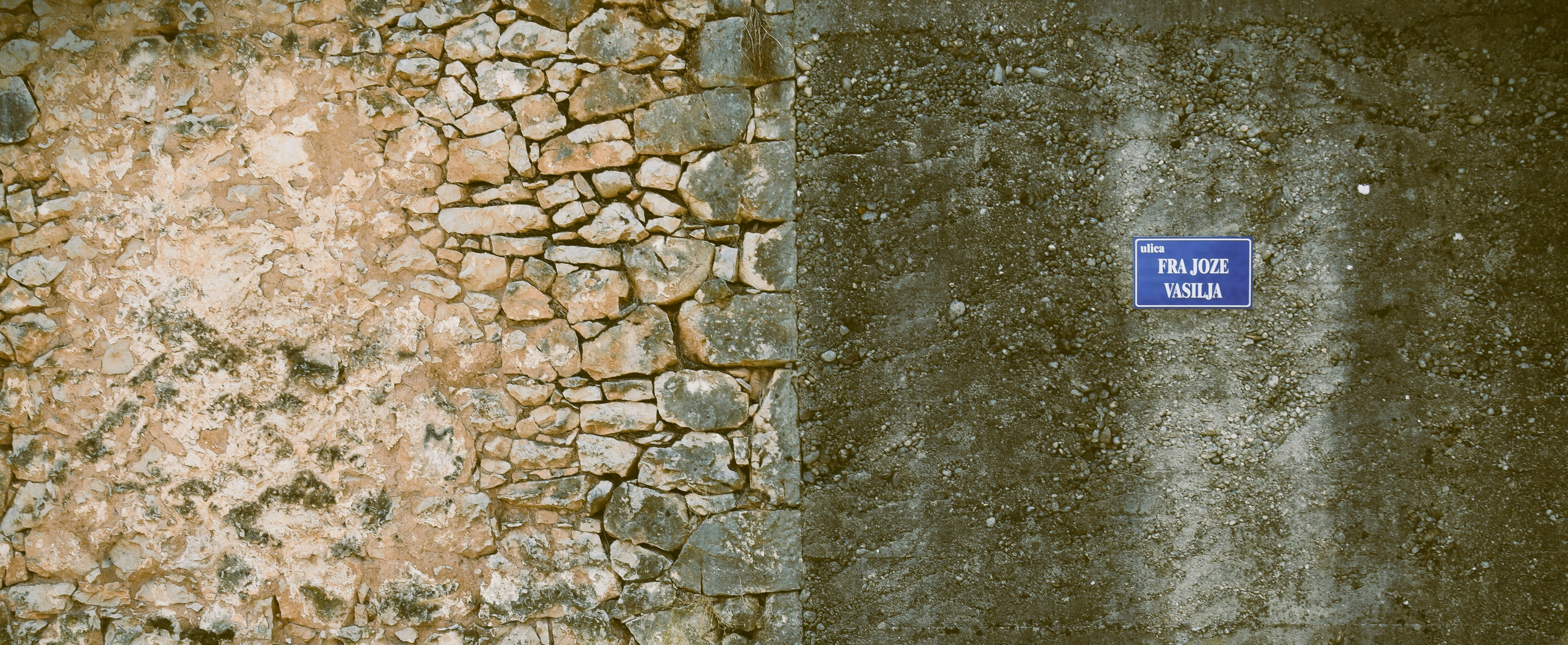 Boundary Between Stone and Shadow: A Quiet Street Scene