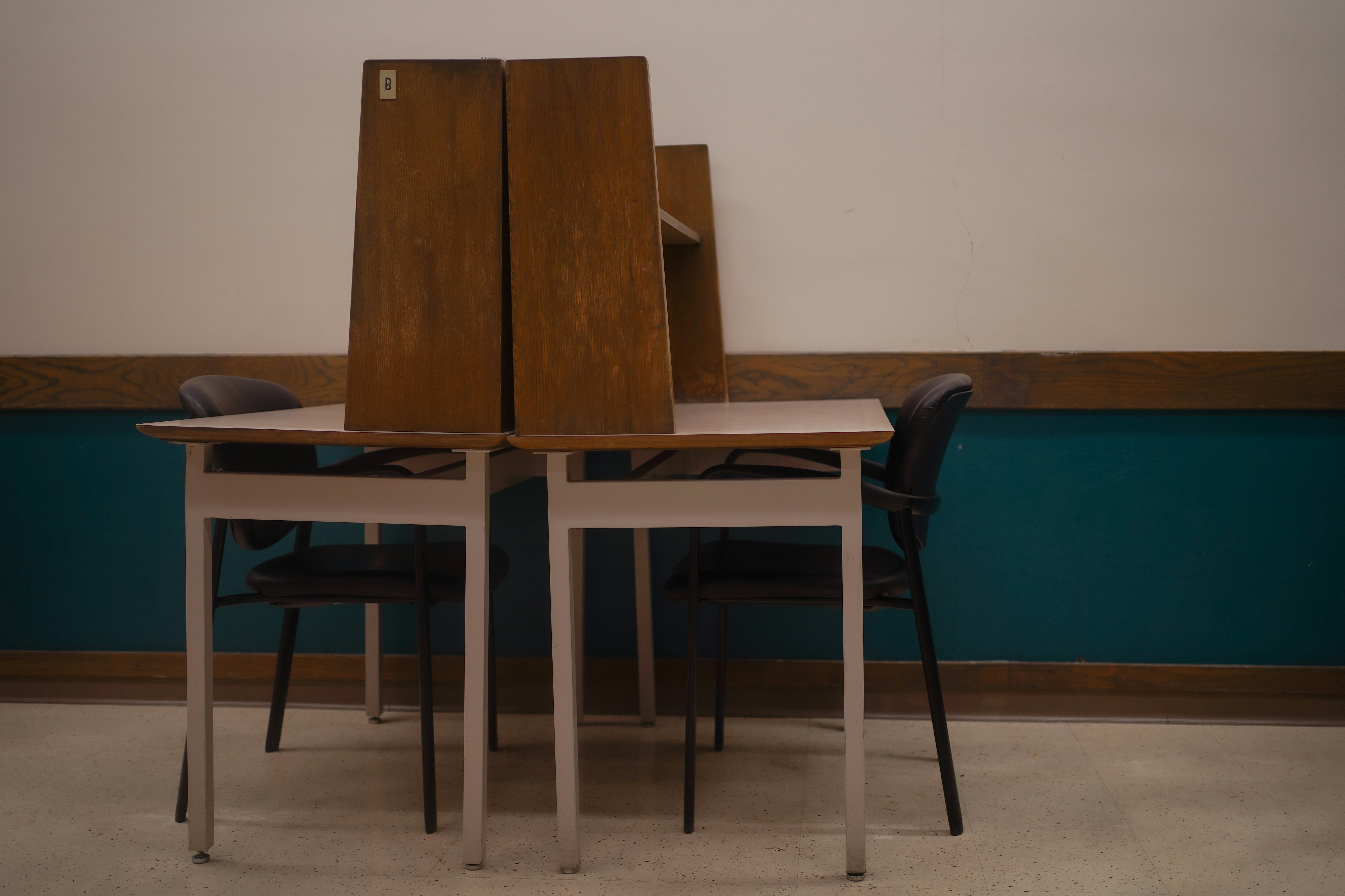 Chairs and wooden dividers in a quiet classroom