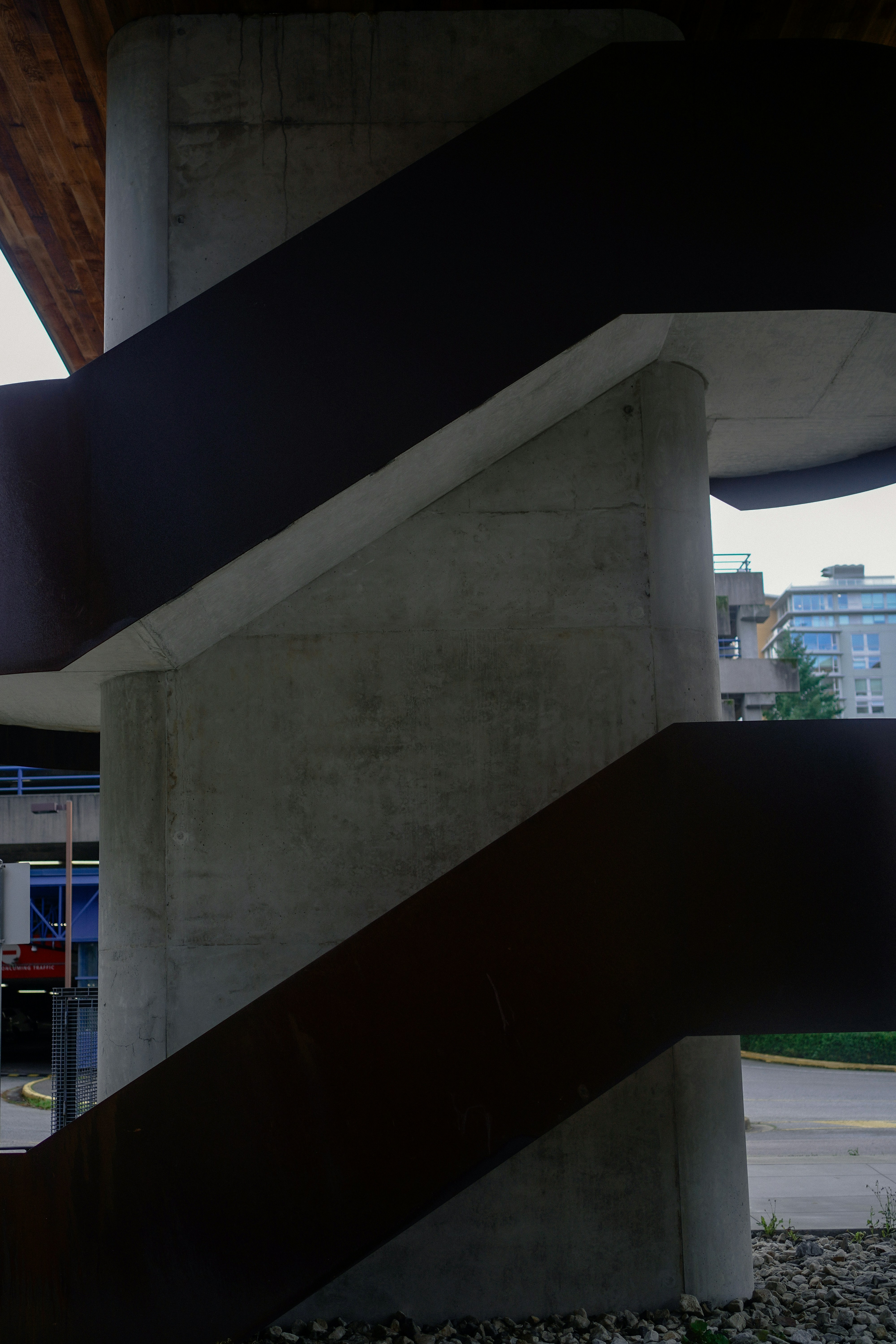 Contrasting Struts: A Concrete Staircase Weaves Through a City