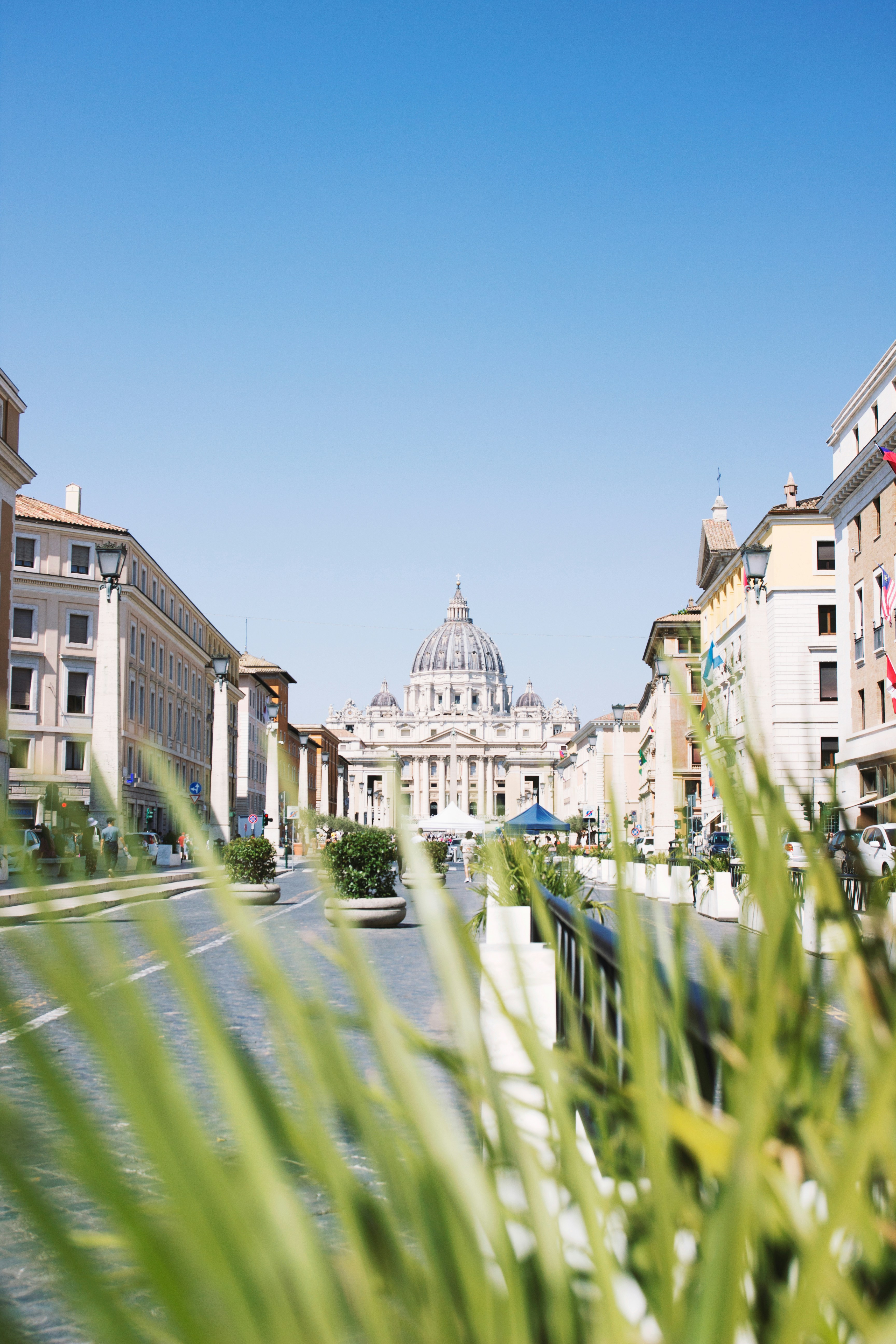 Cupola Dreams: St. Peter's Basilica Framed by a City Avenue