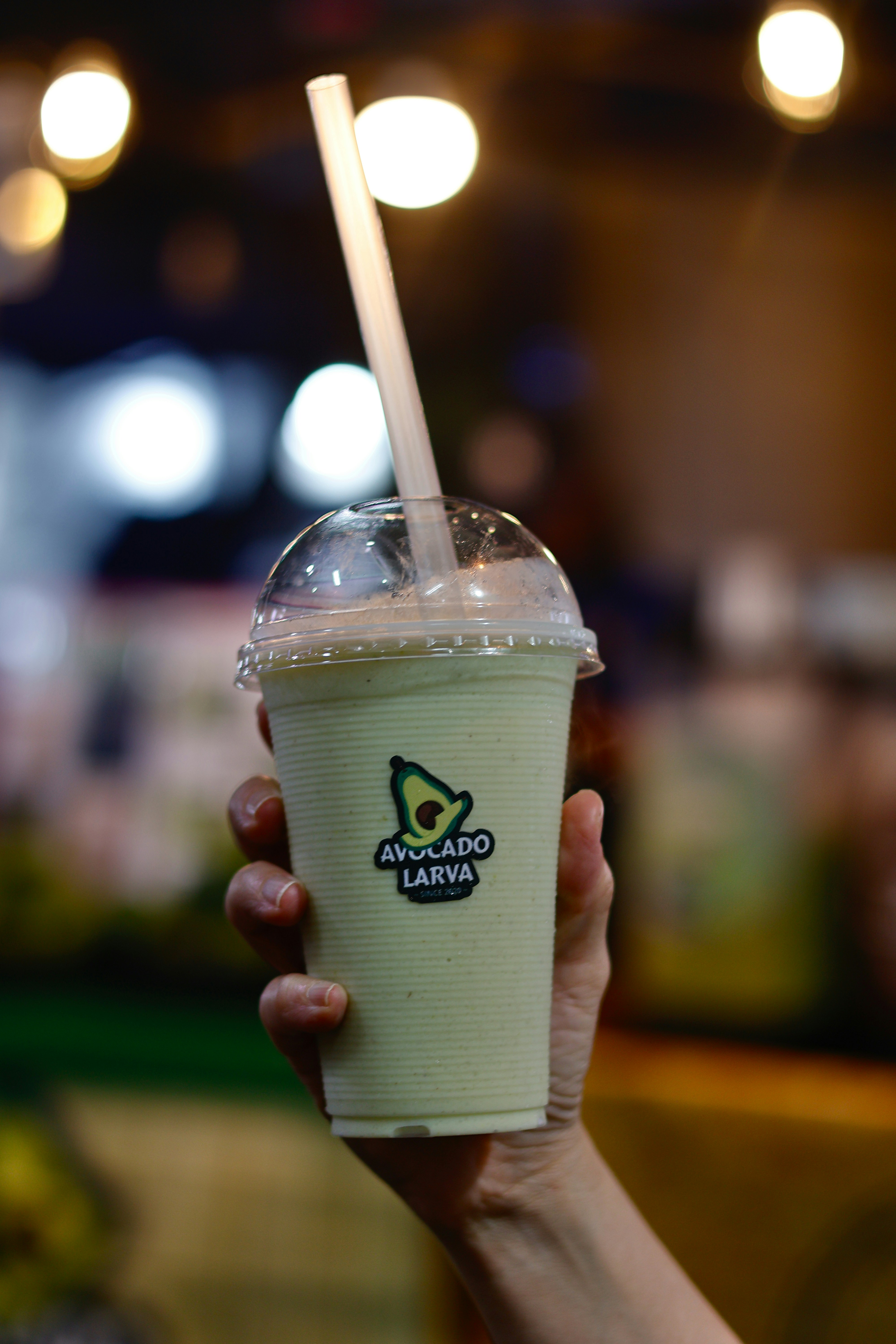 Avocado Lime Shake Sealed with a Straw