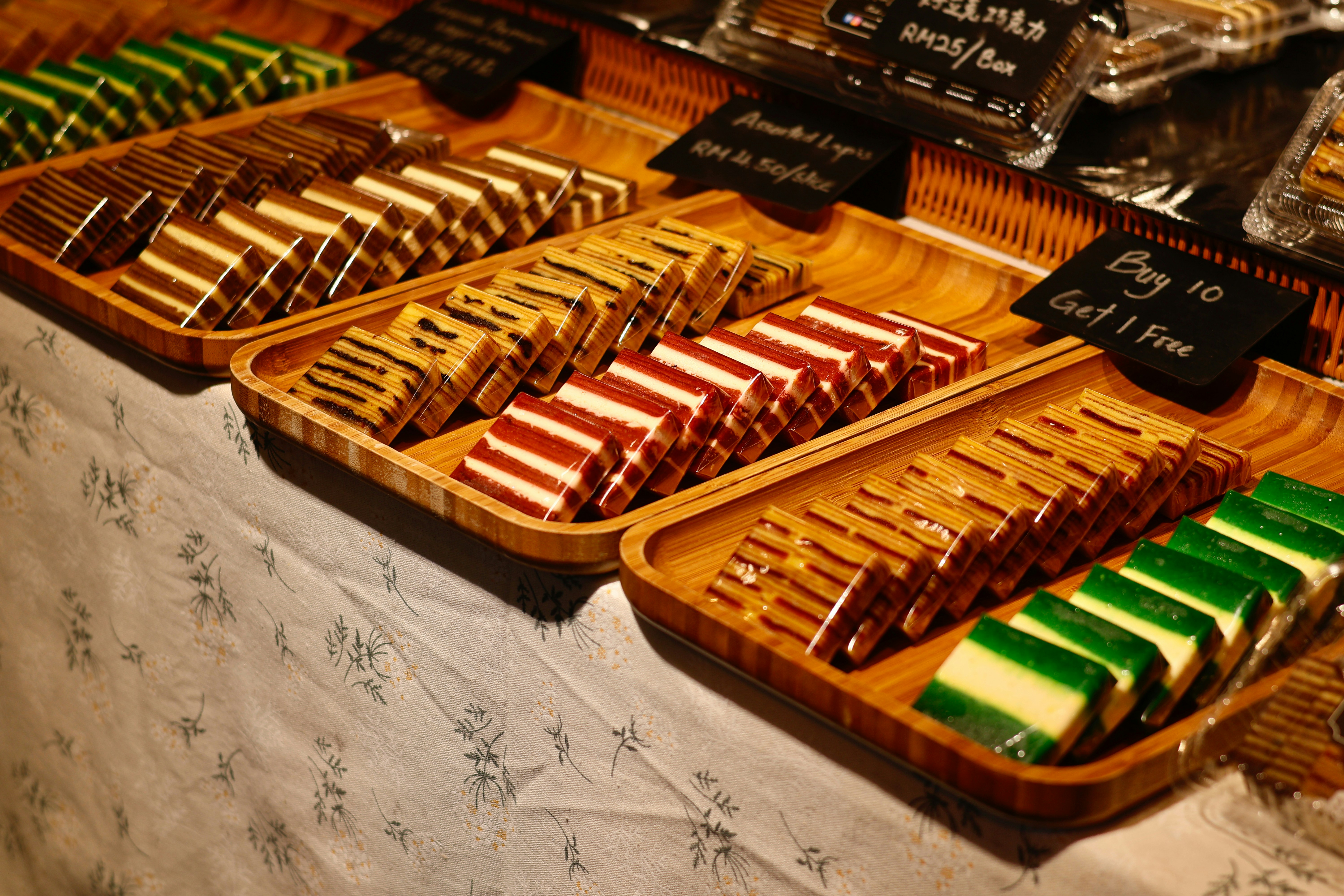 Rows of Handcrafted Chocolate Truffles: A Palette of Cocoa and Color