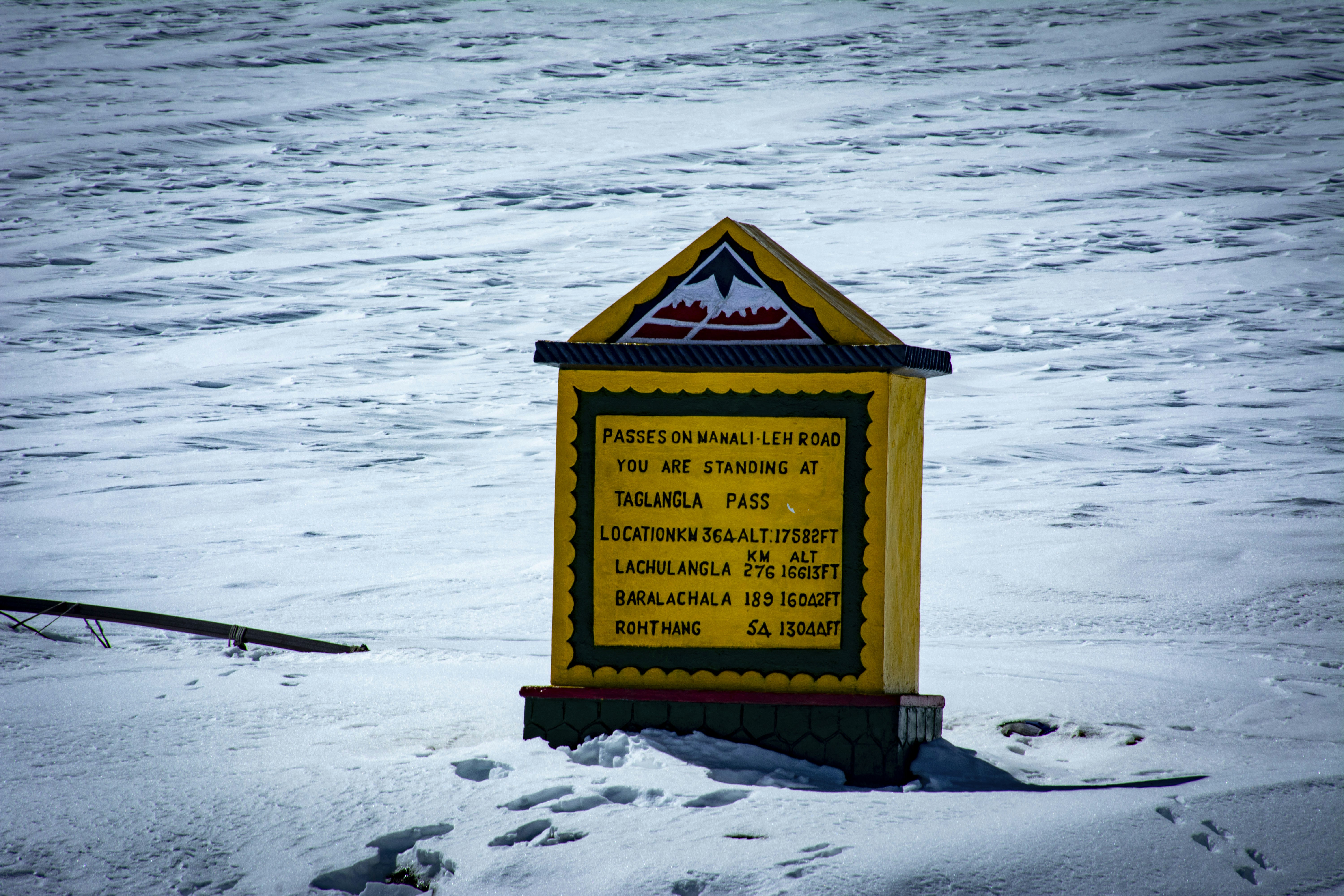 Snowbound Signpost in a Quiet, Frigid Landscape