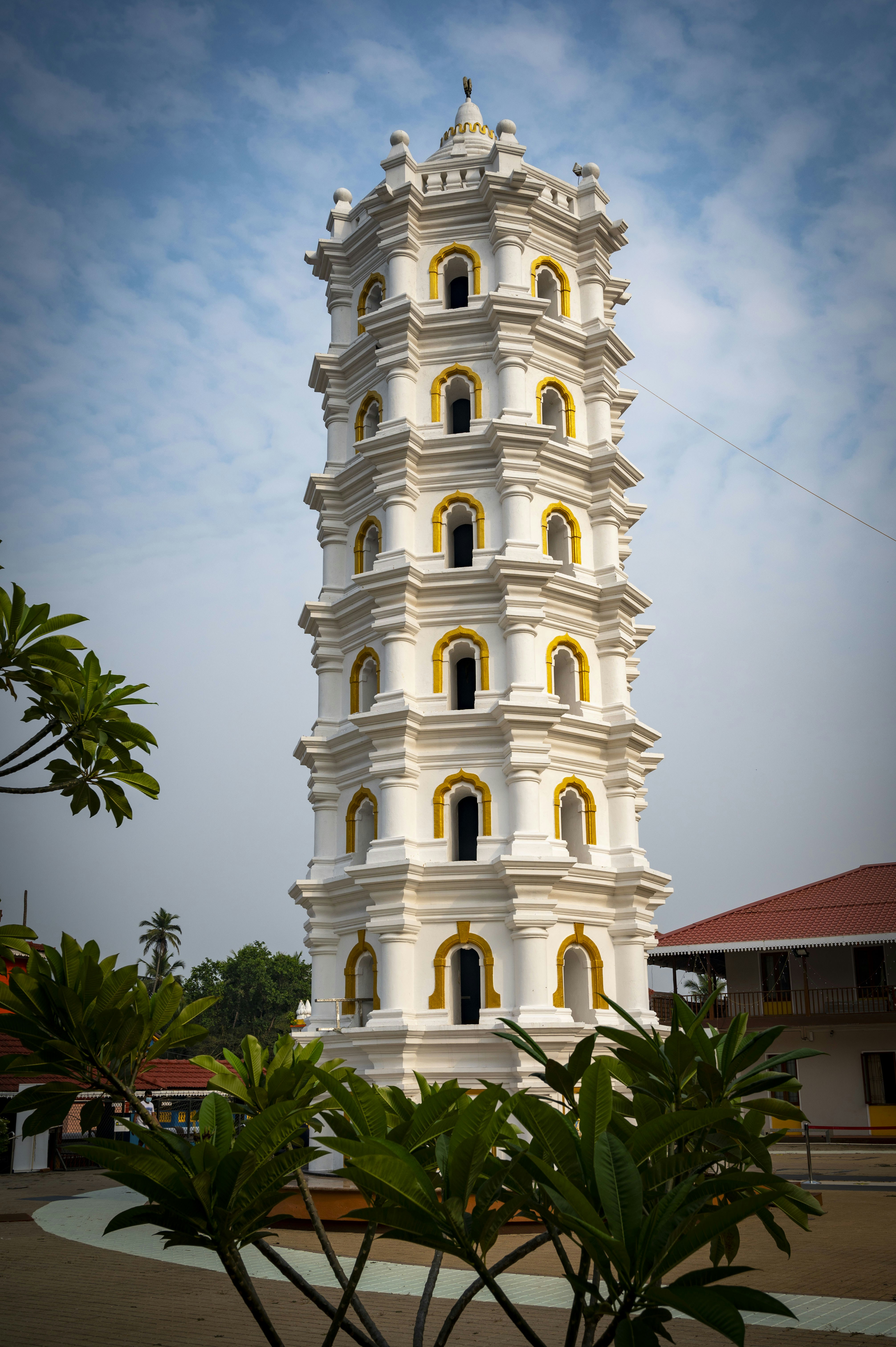 Vertical Shrine: A White Bell Tower Reaches Toward the Sky