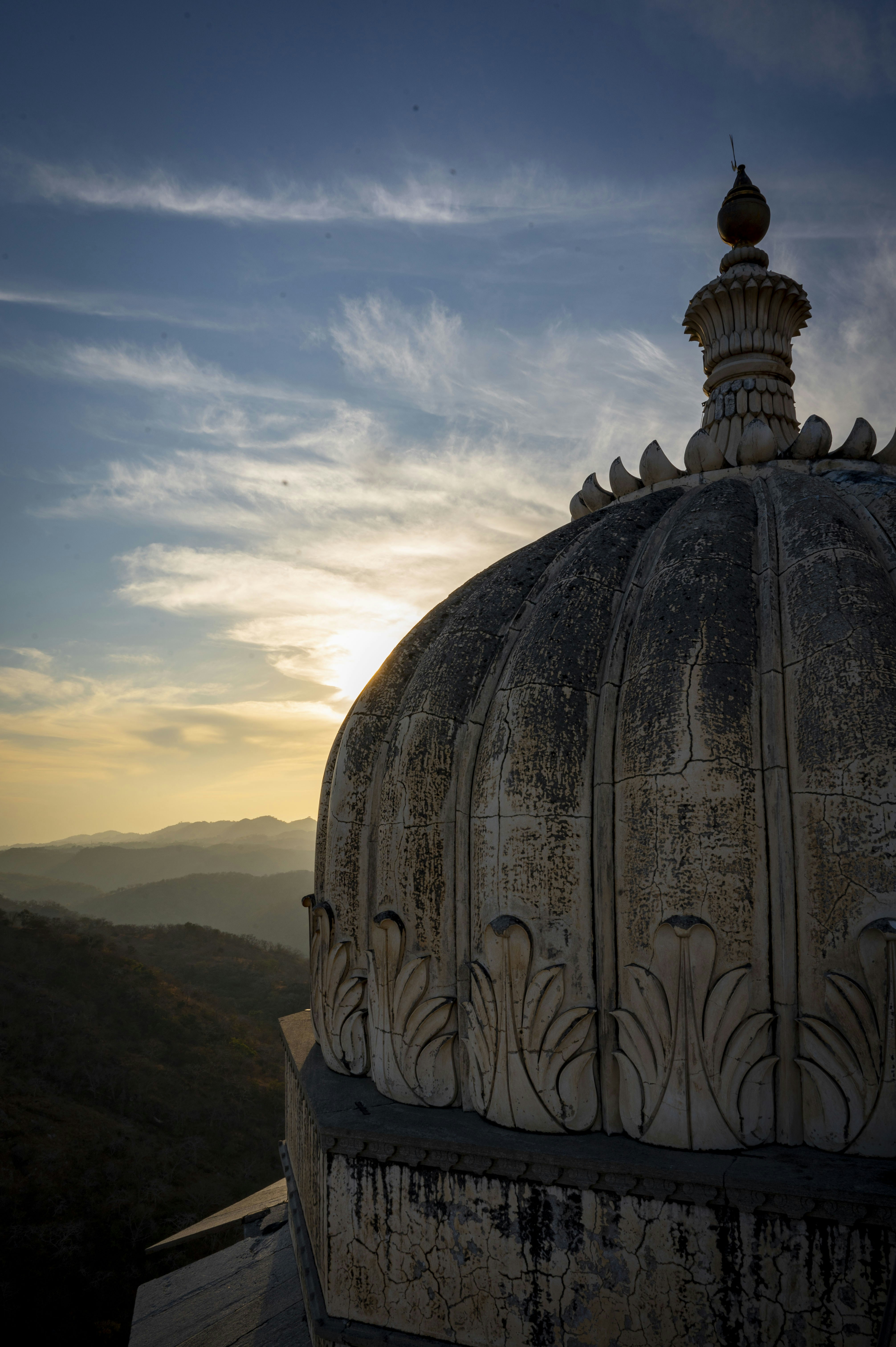 Sunlit Dome: Weathered Ornament on a Himalayan Rooftop