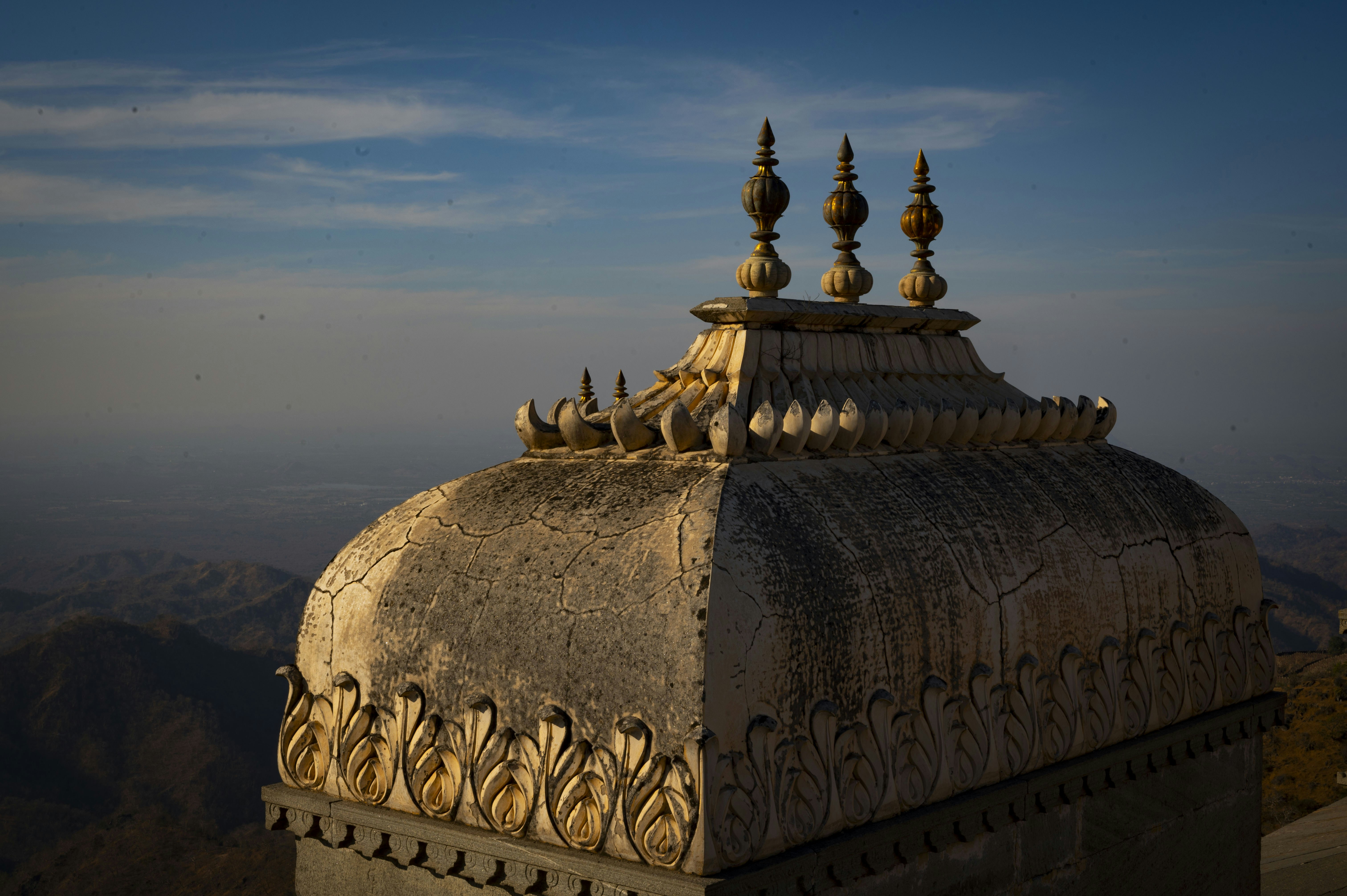 Stone Dhow: A Temple Top Crowned in Early Light