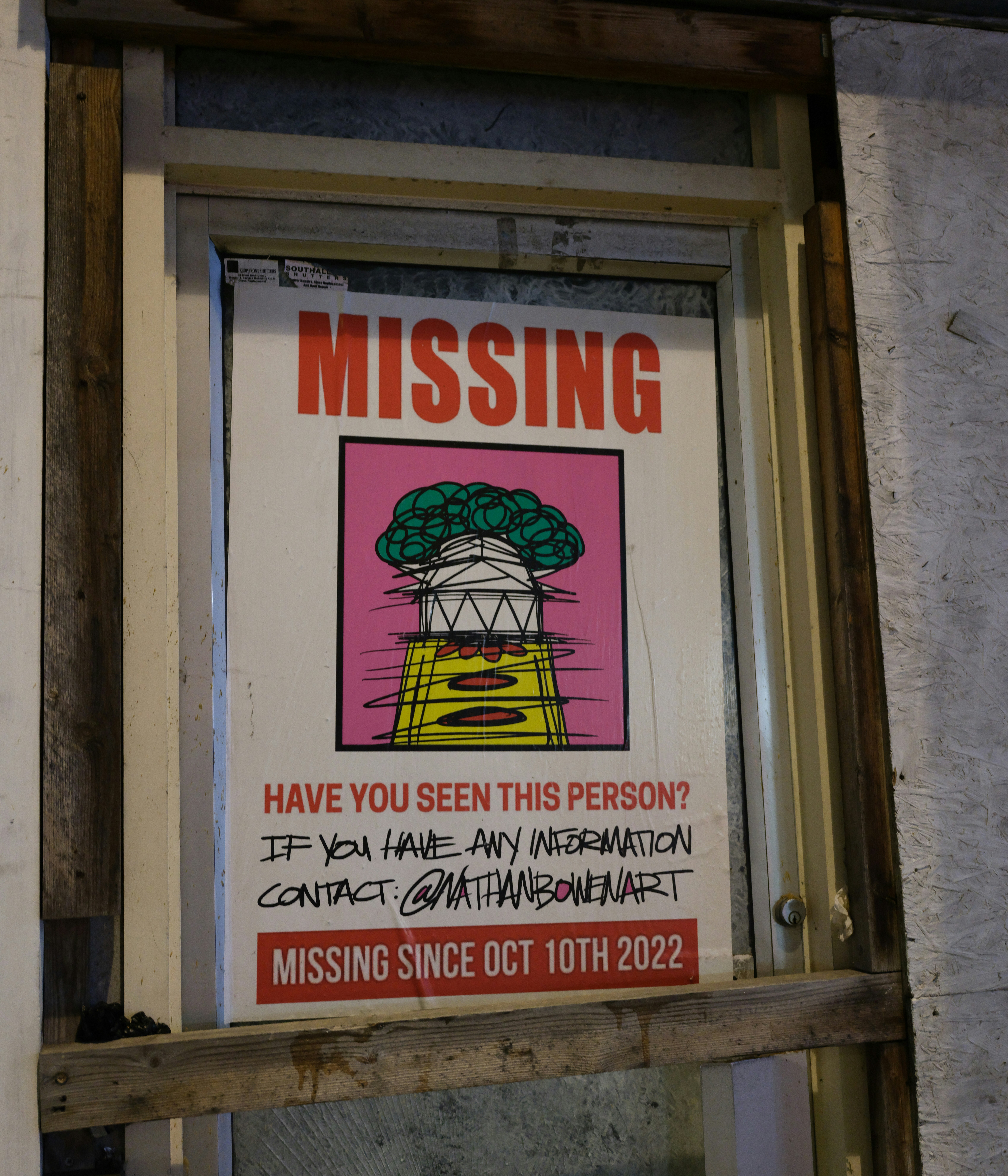 Missing poster with stylized drawing in window