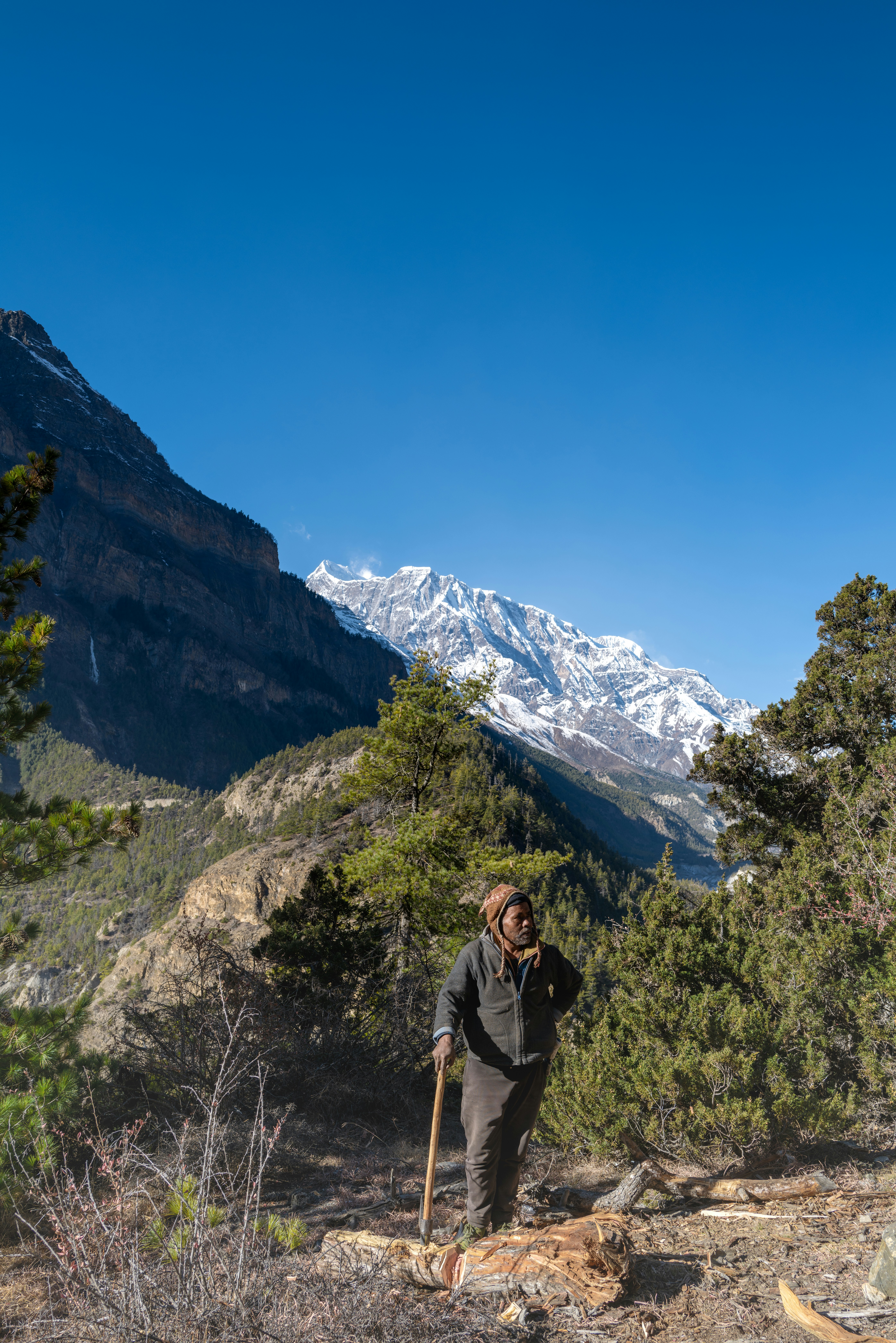Climber with Alpine Backdrop: A Quiet Ascent