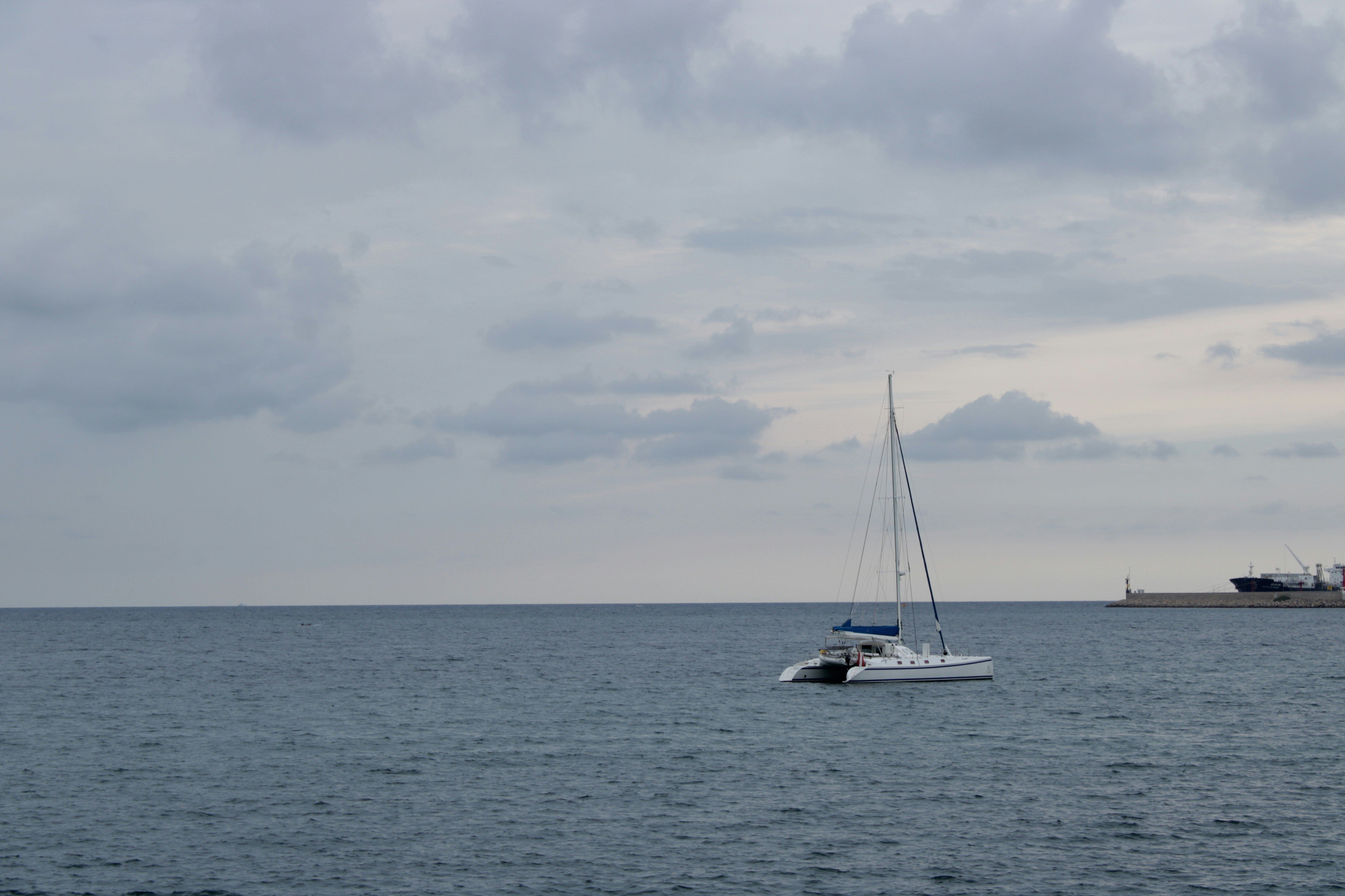 Sailboat at the Quiet Horizon