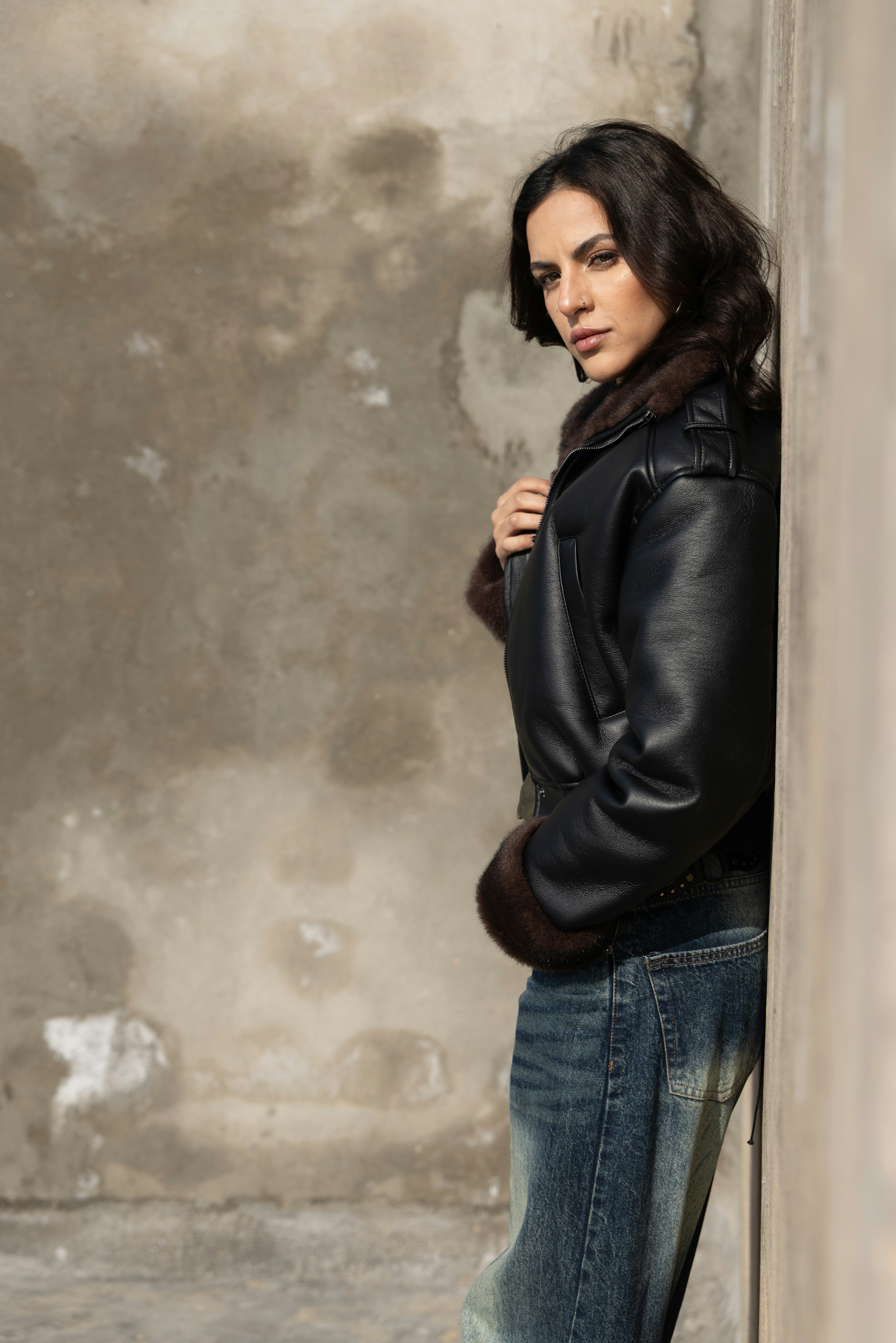 Edge of Light: A Portrait by the Concrete Wall