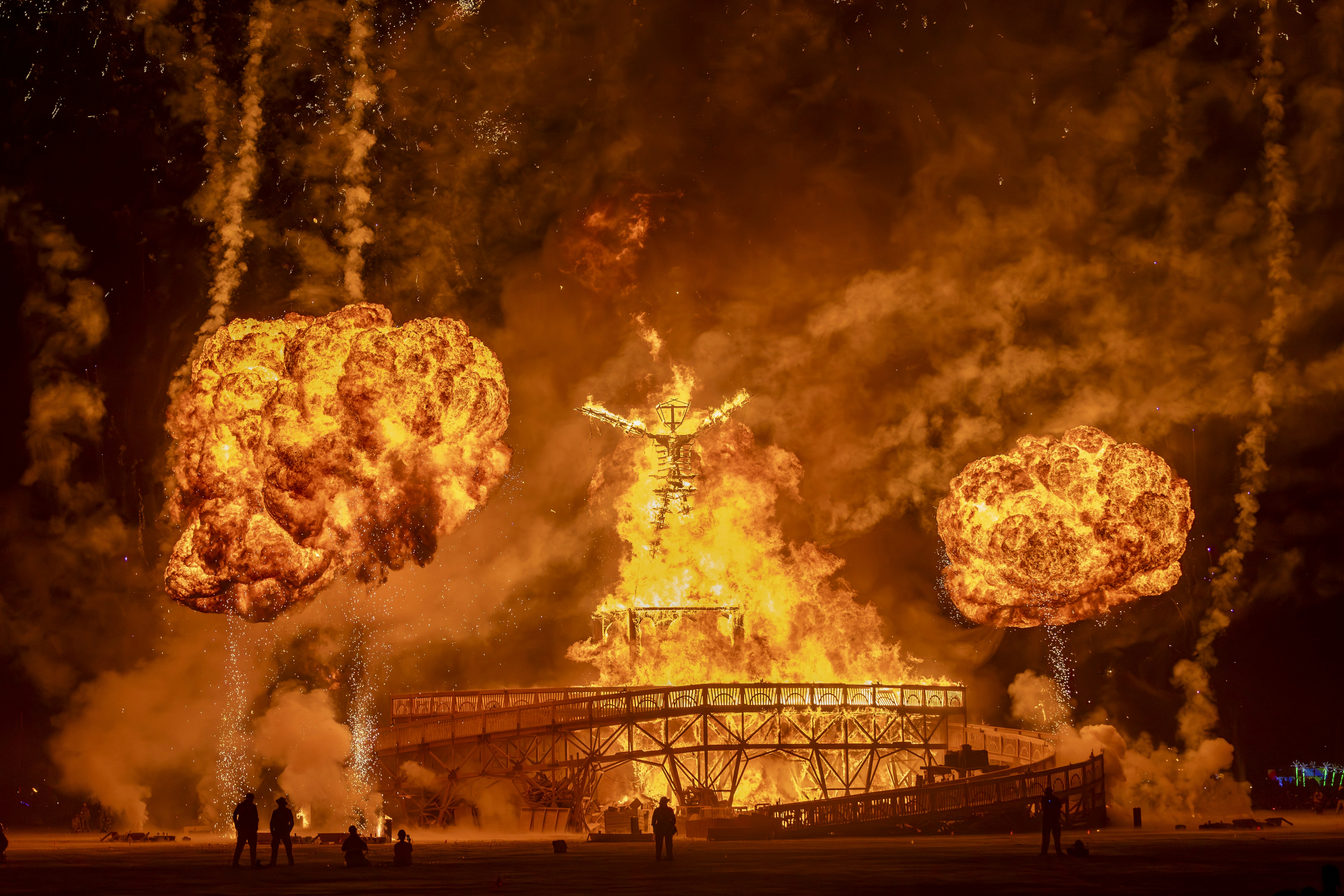 Inferno Carnival: Fireball Ceremony Surrounded by Nighttime Spectacle