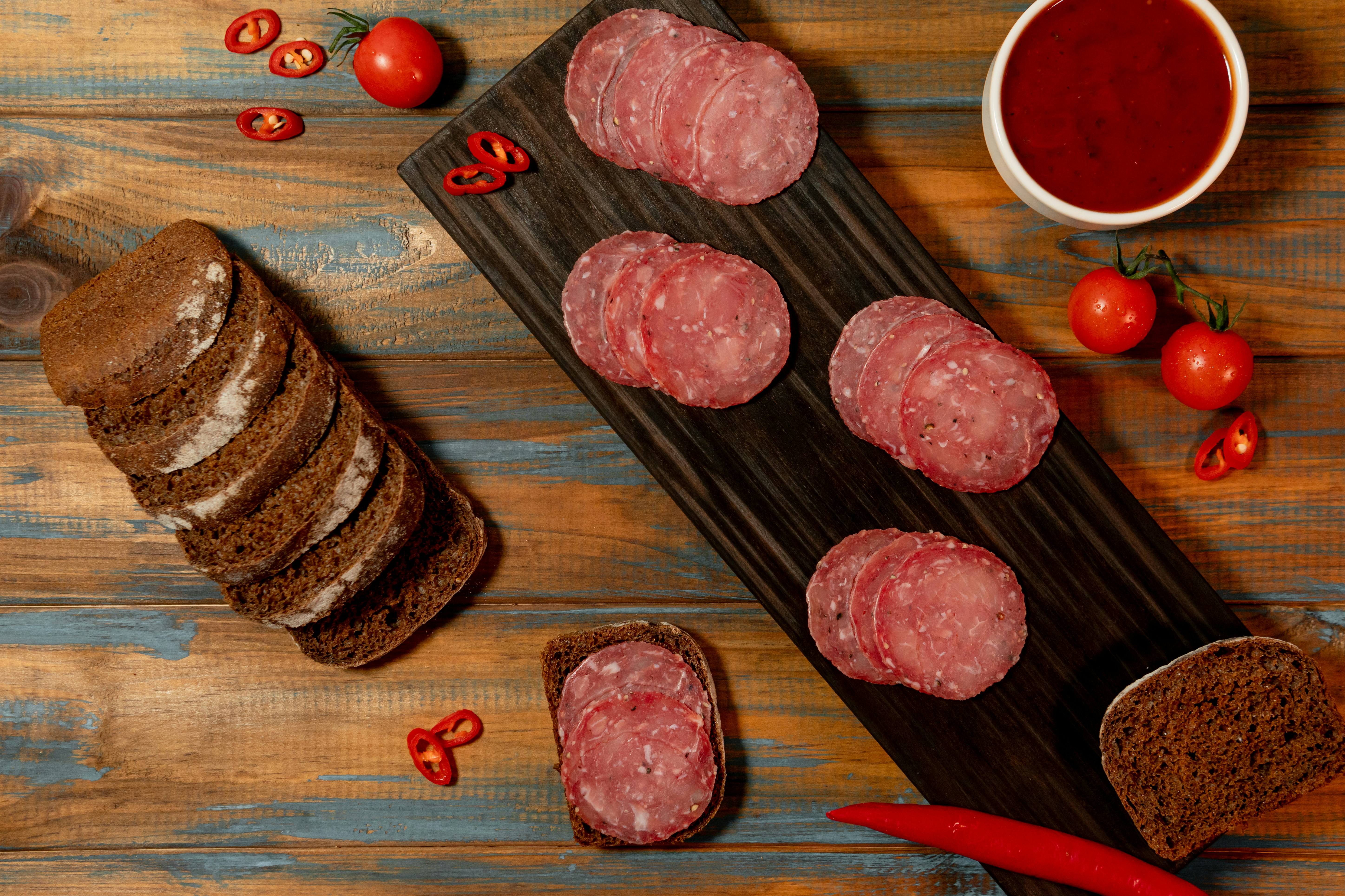 Charcuterie on a Rustic Board: Slices of Cured Bliss