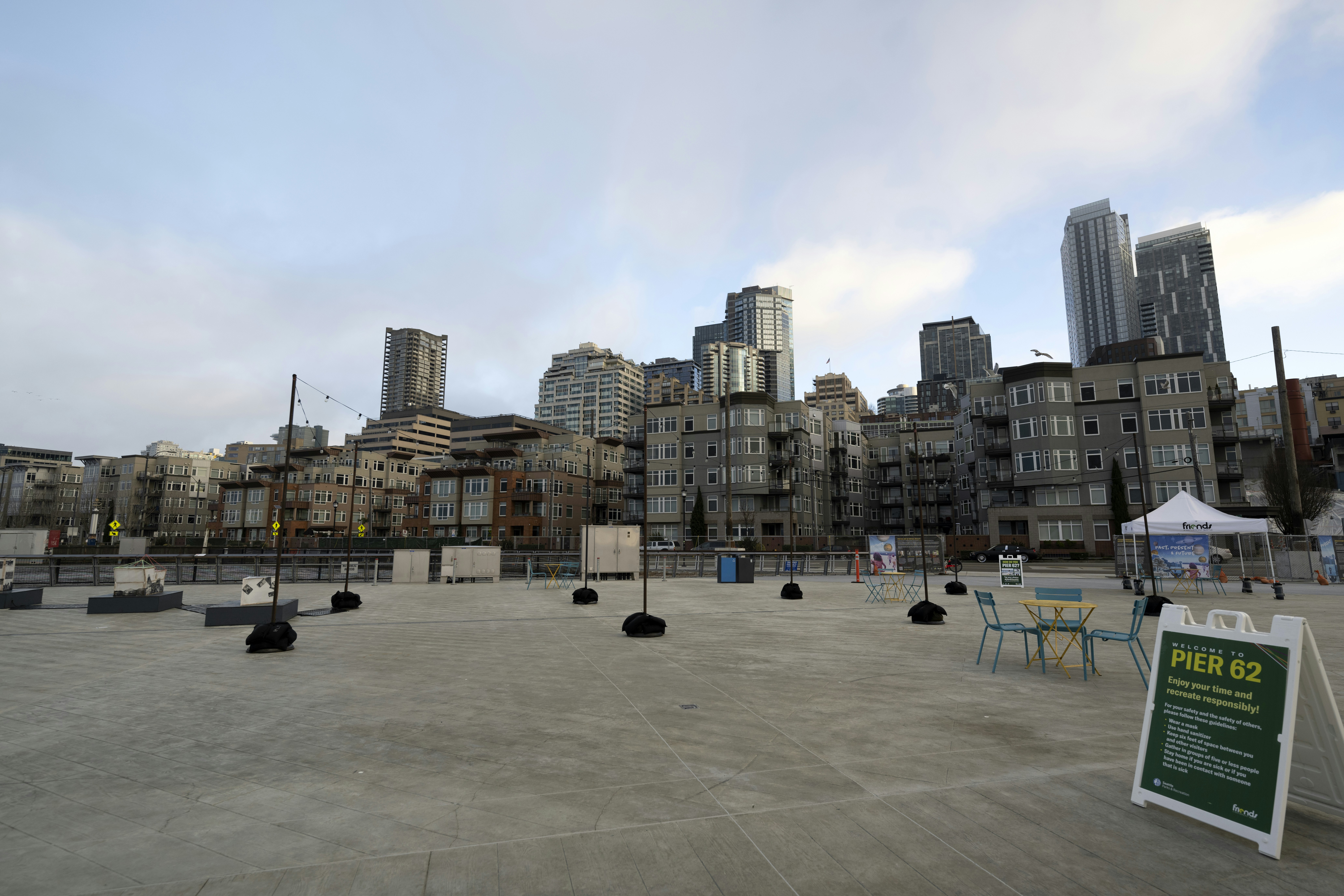 Urban Horizon: Concrete Forecourt Against a Tall Cityscape