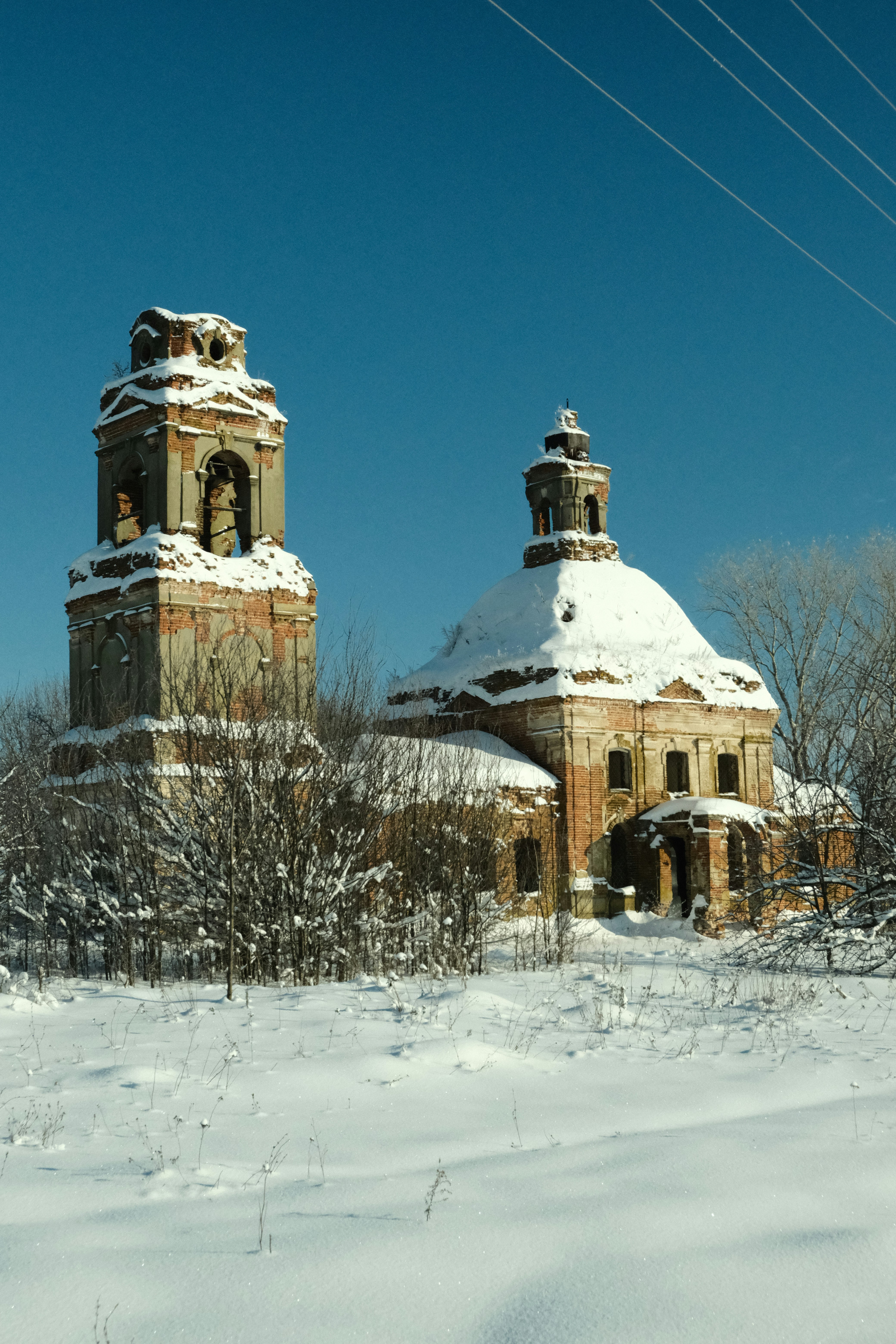 Snowbound Cathedral: Bricks, Towers, and Quiet Heavy Skies