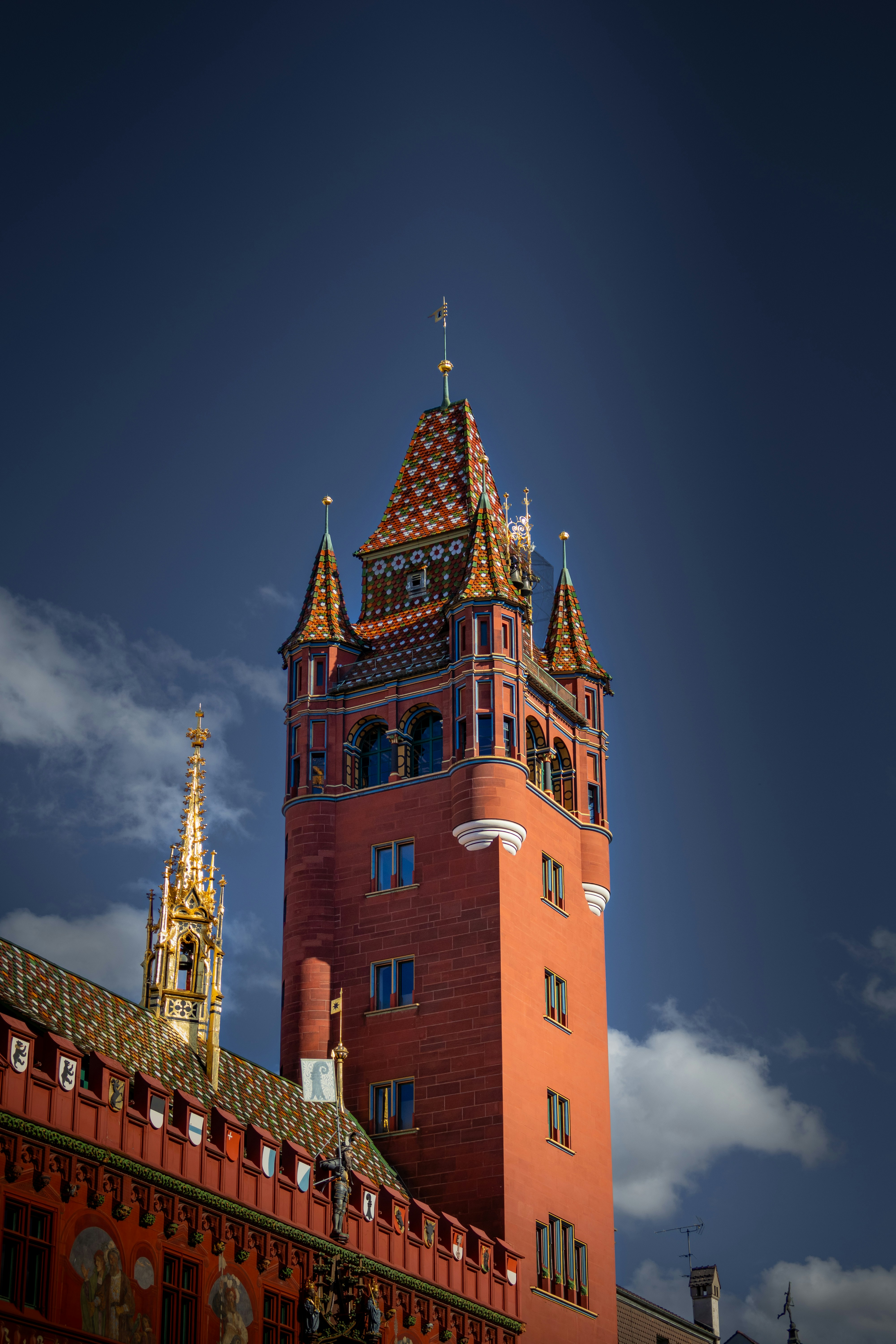 Towering Red Turret Reaching Toward a Clear Sky