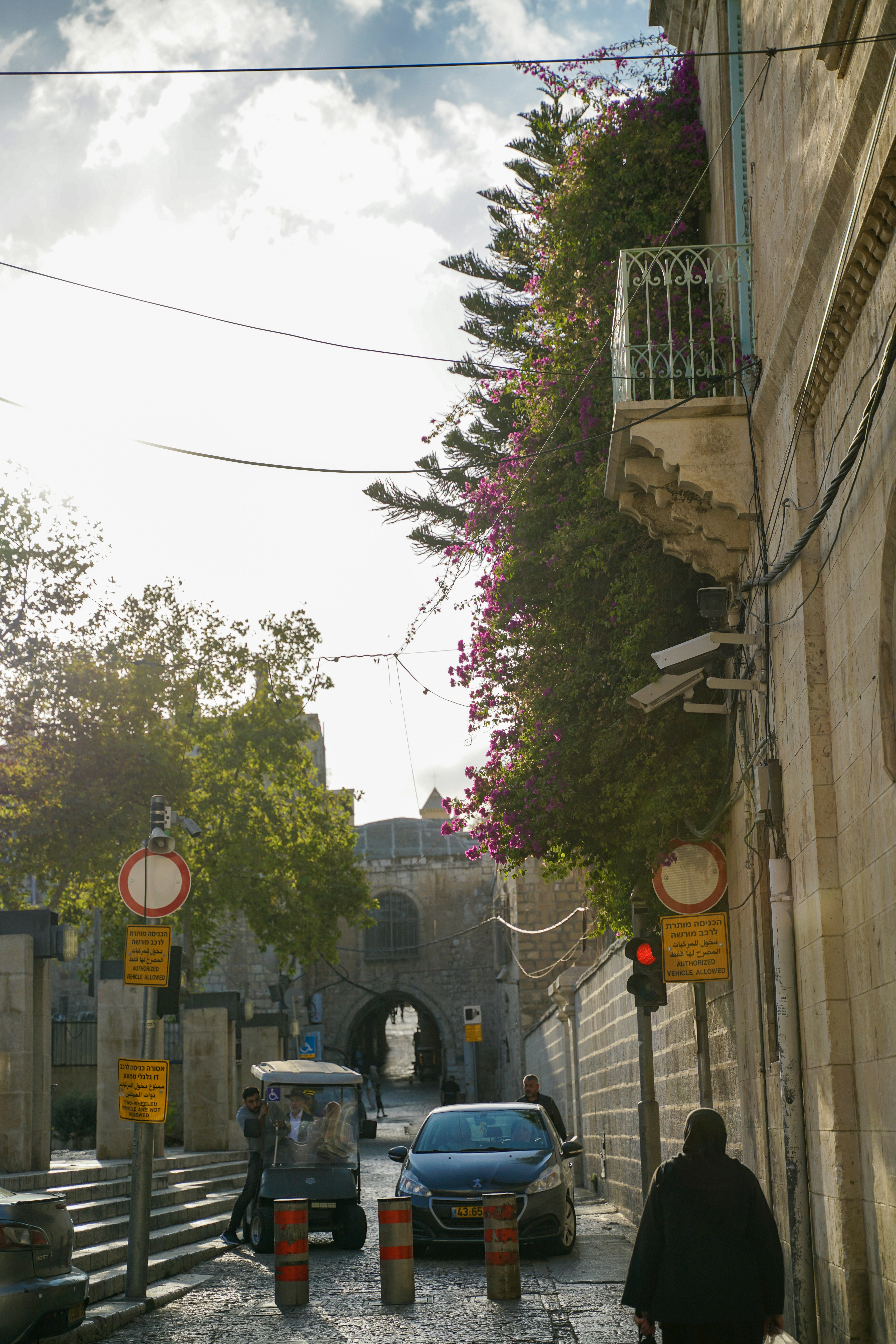 Street Corridor to the Atrium: Morning Light on an Arched Gateway