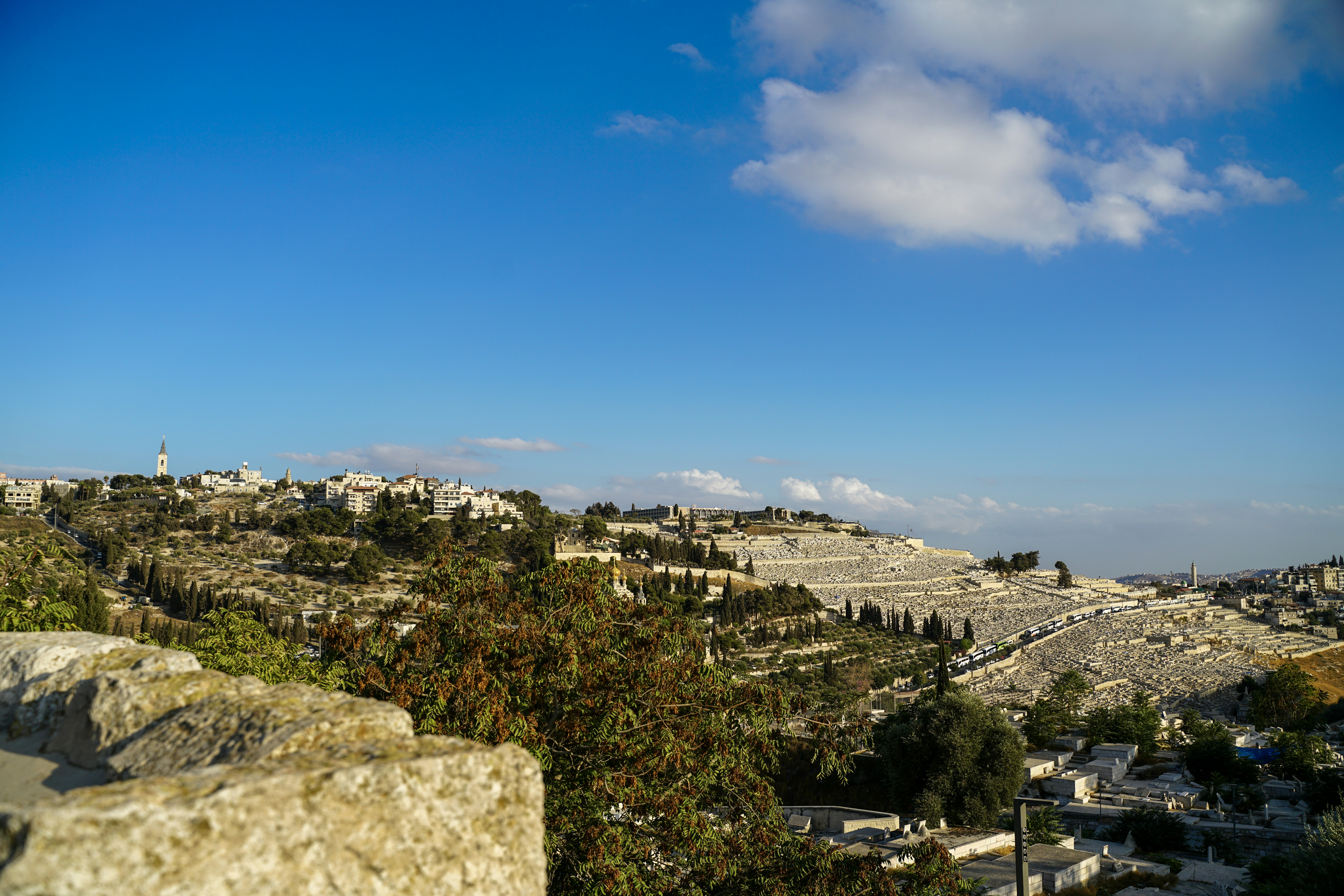 Hilltop Village under a Clear Blue Sky