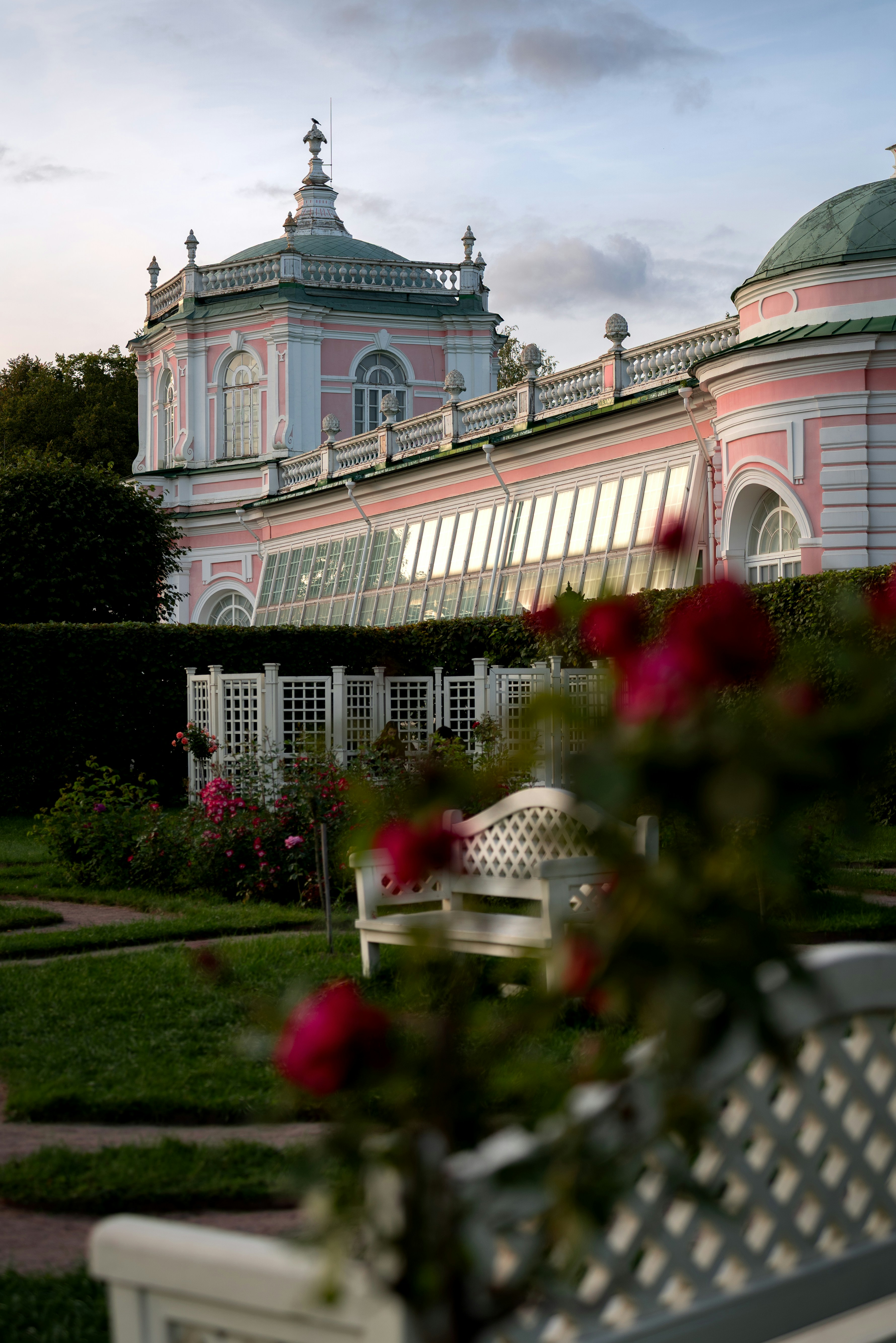 Pastel Pavilion: A Garden Scene Framed by Ornate Architecture