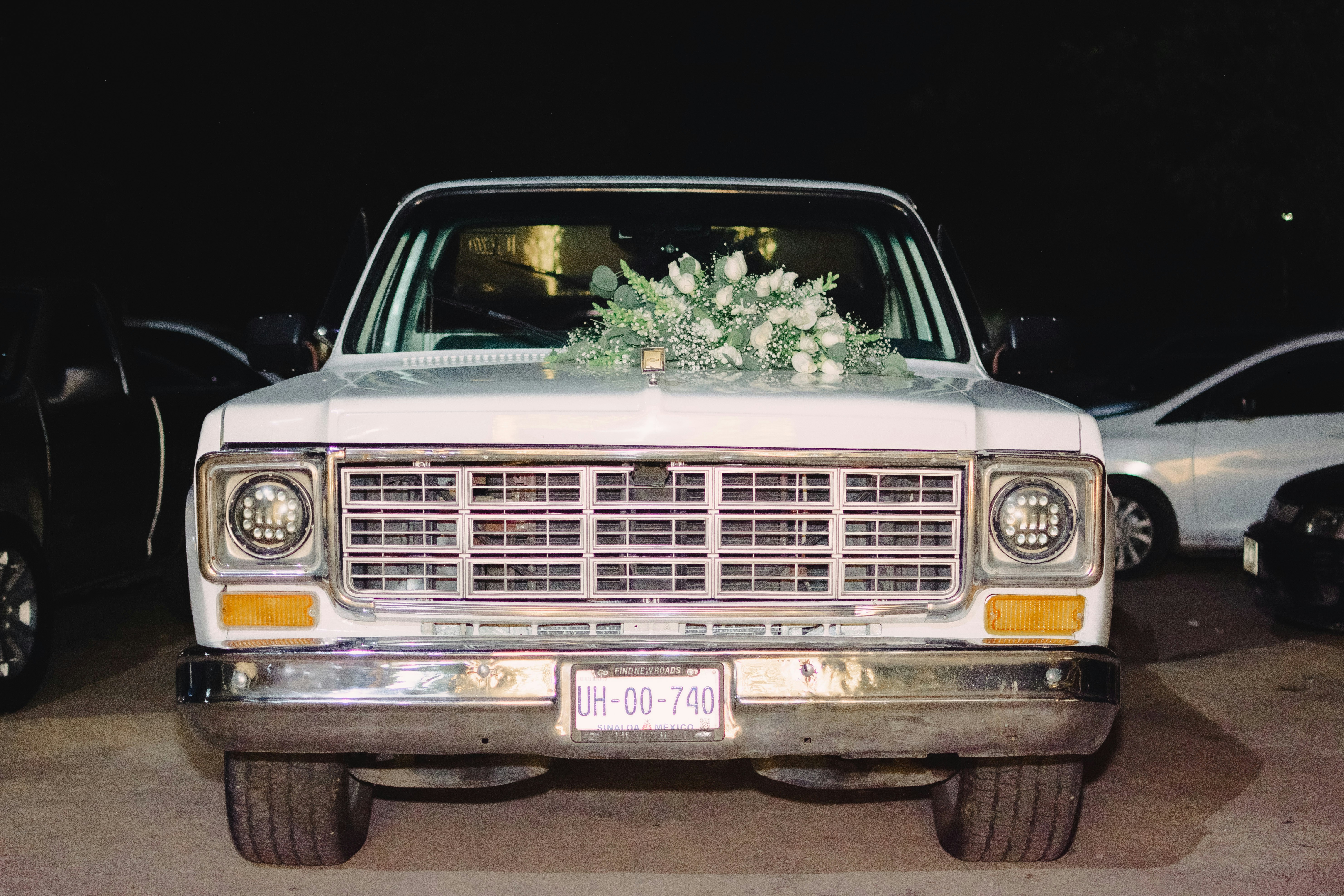 Midnight Noir: A Classic Pickup Dressed in Floral Quiet