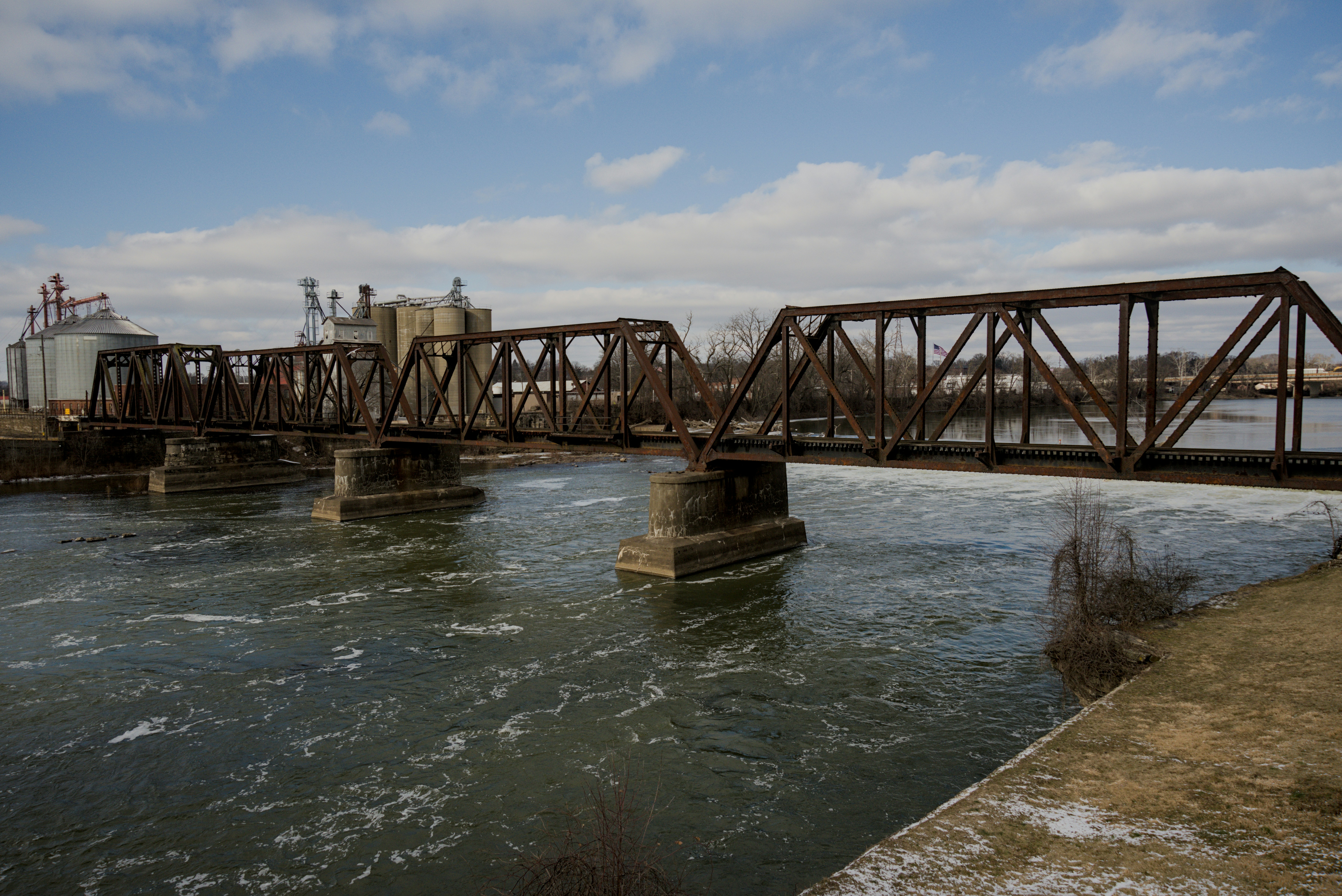 Rustic Ironwork over a Gliding River