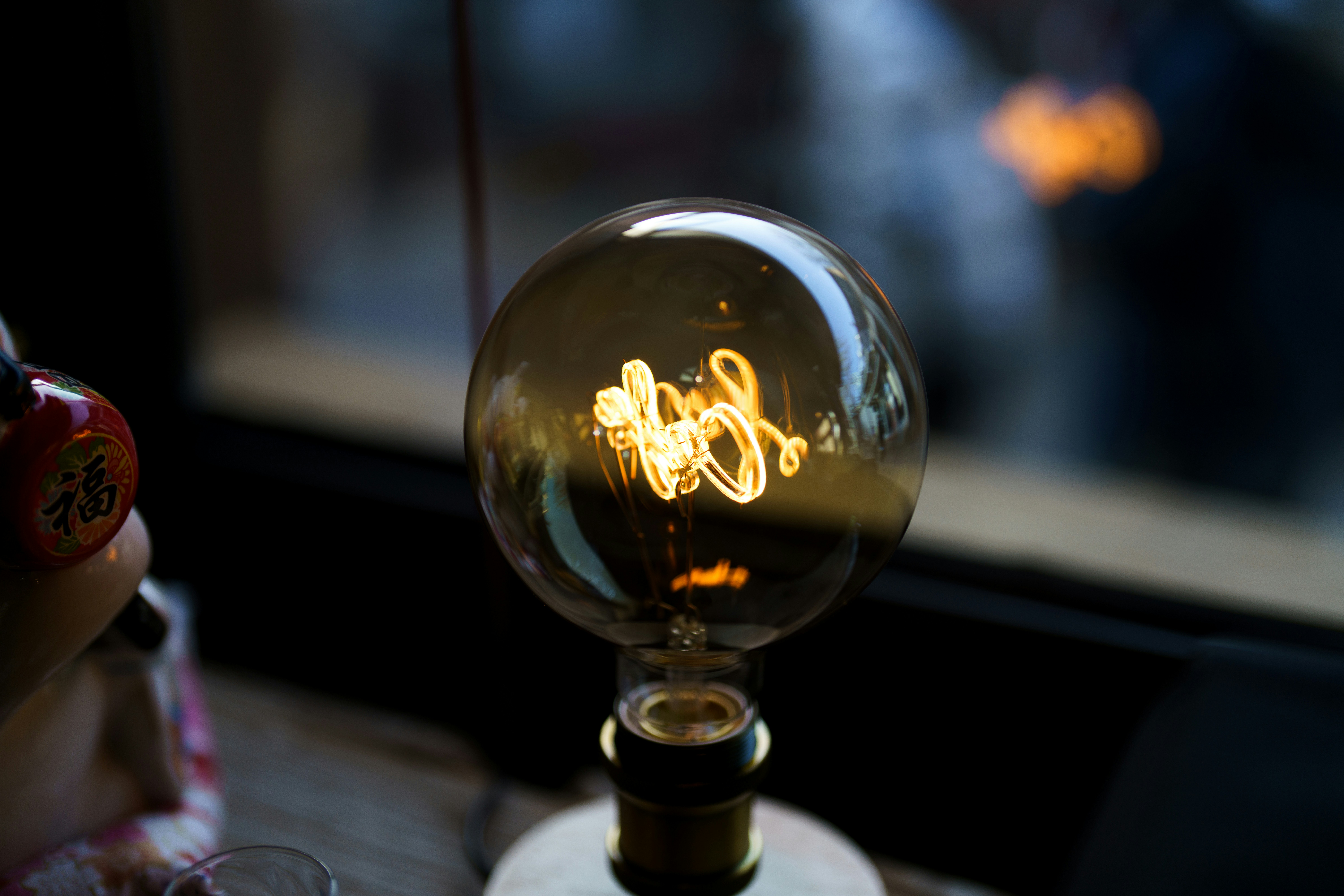 Glowing Filament in a Quiet Window Light