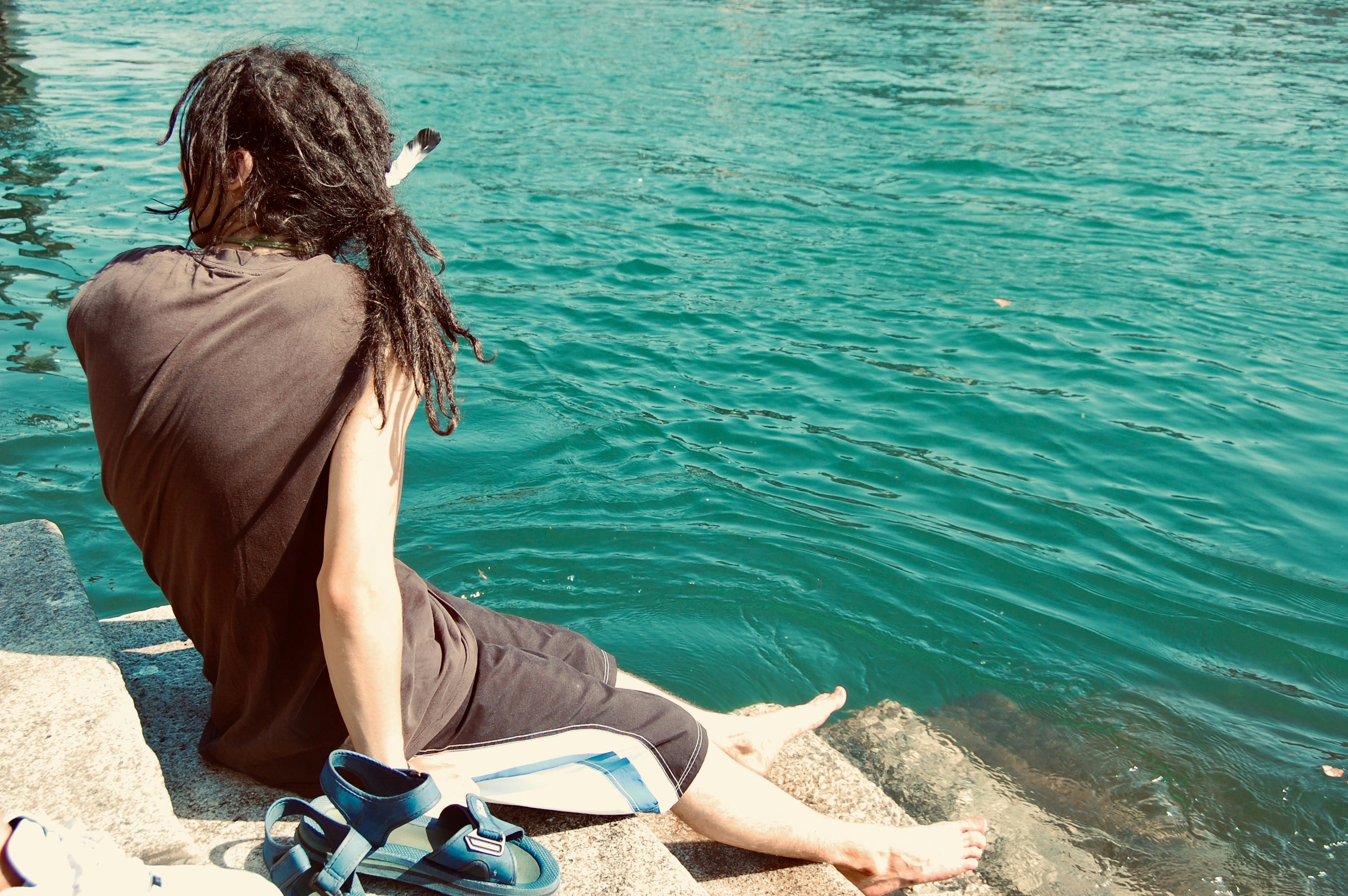 Footsteps on the Quiet Pier: a sunlit shore portrait