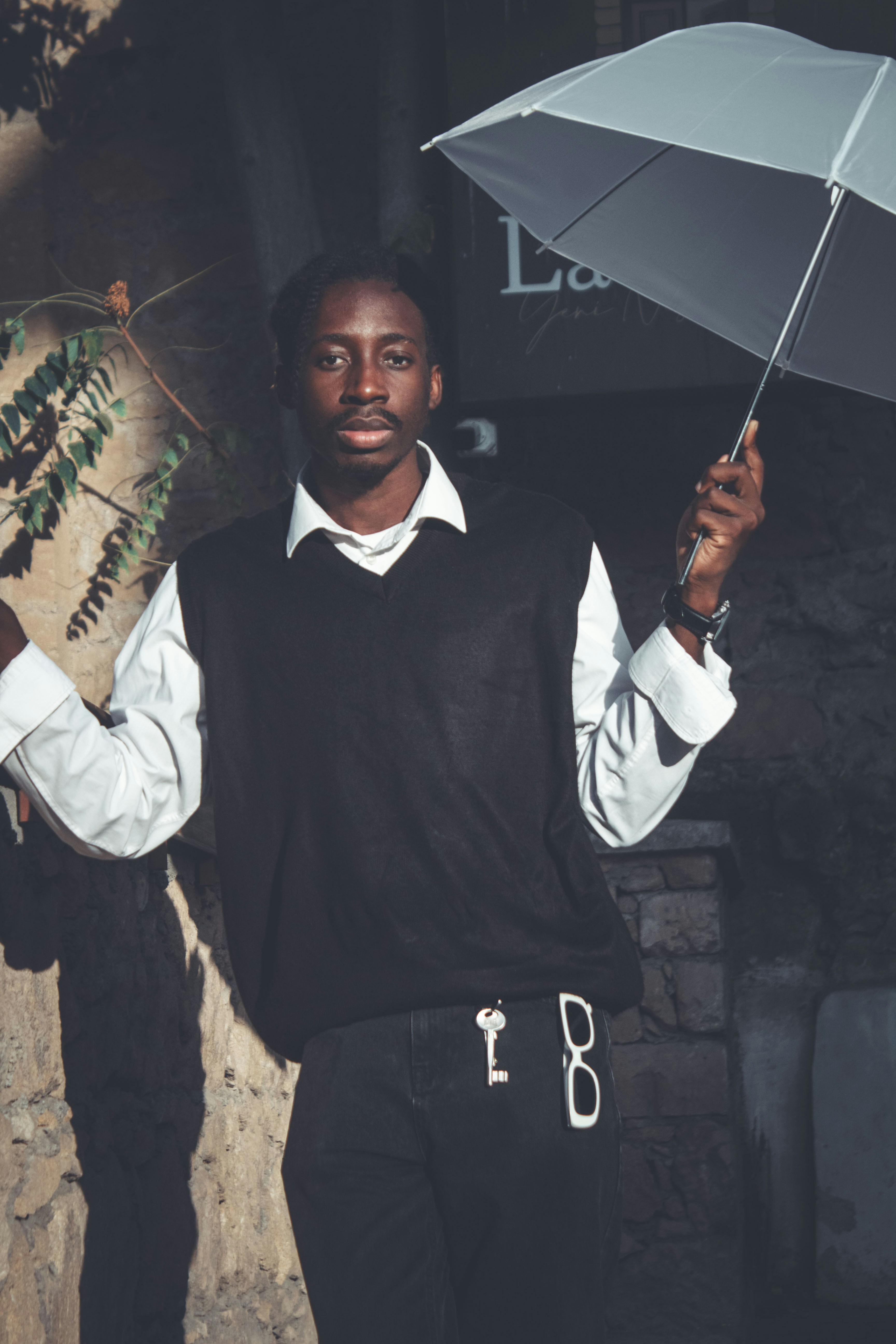 Under the Umbrella: A Quiet Moment of Confidence