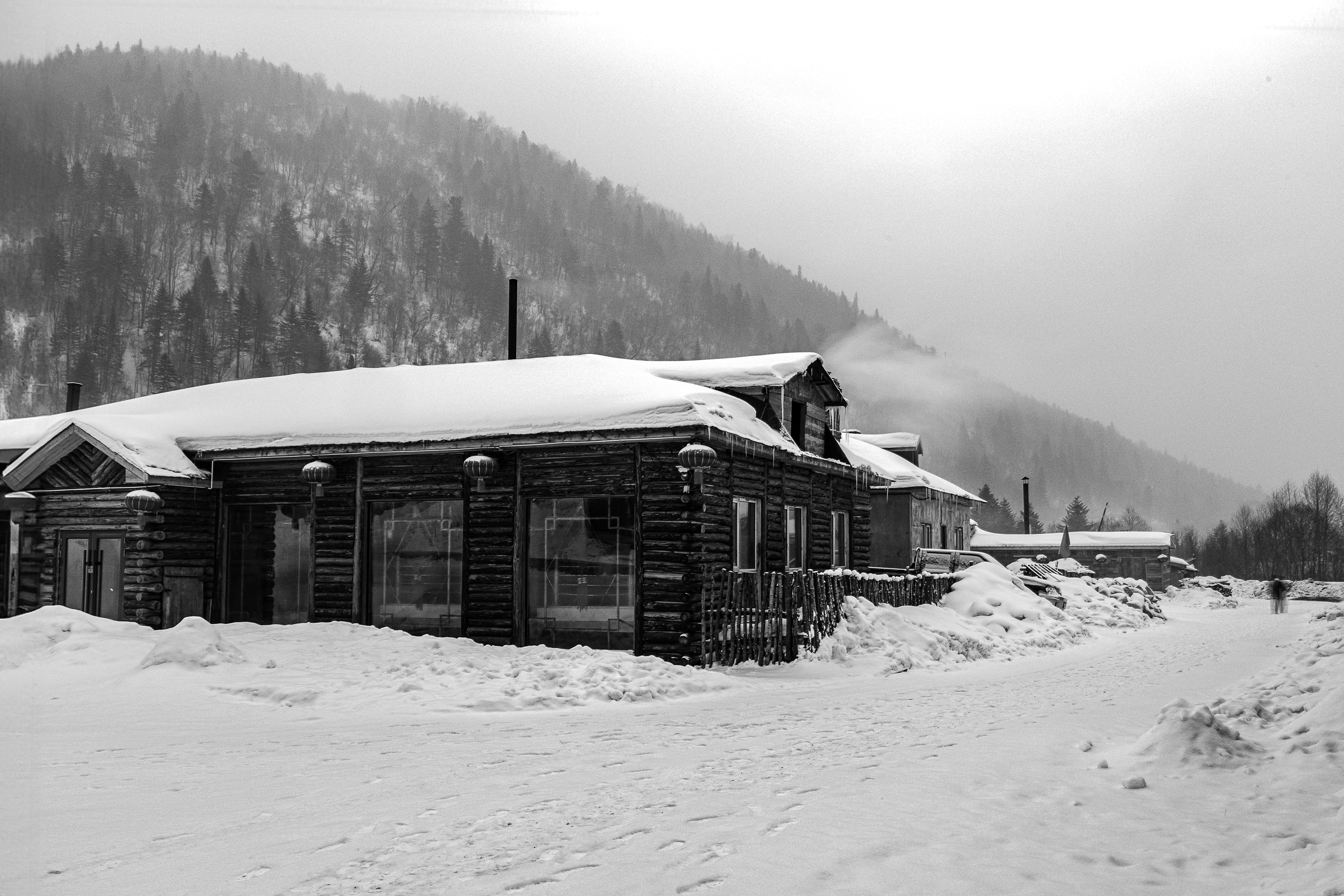 Snowbound Lodge Beneath the Quiet Morning Mist