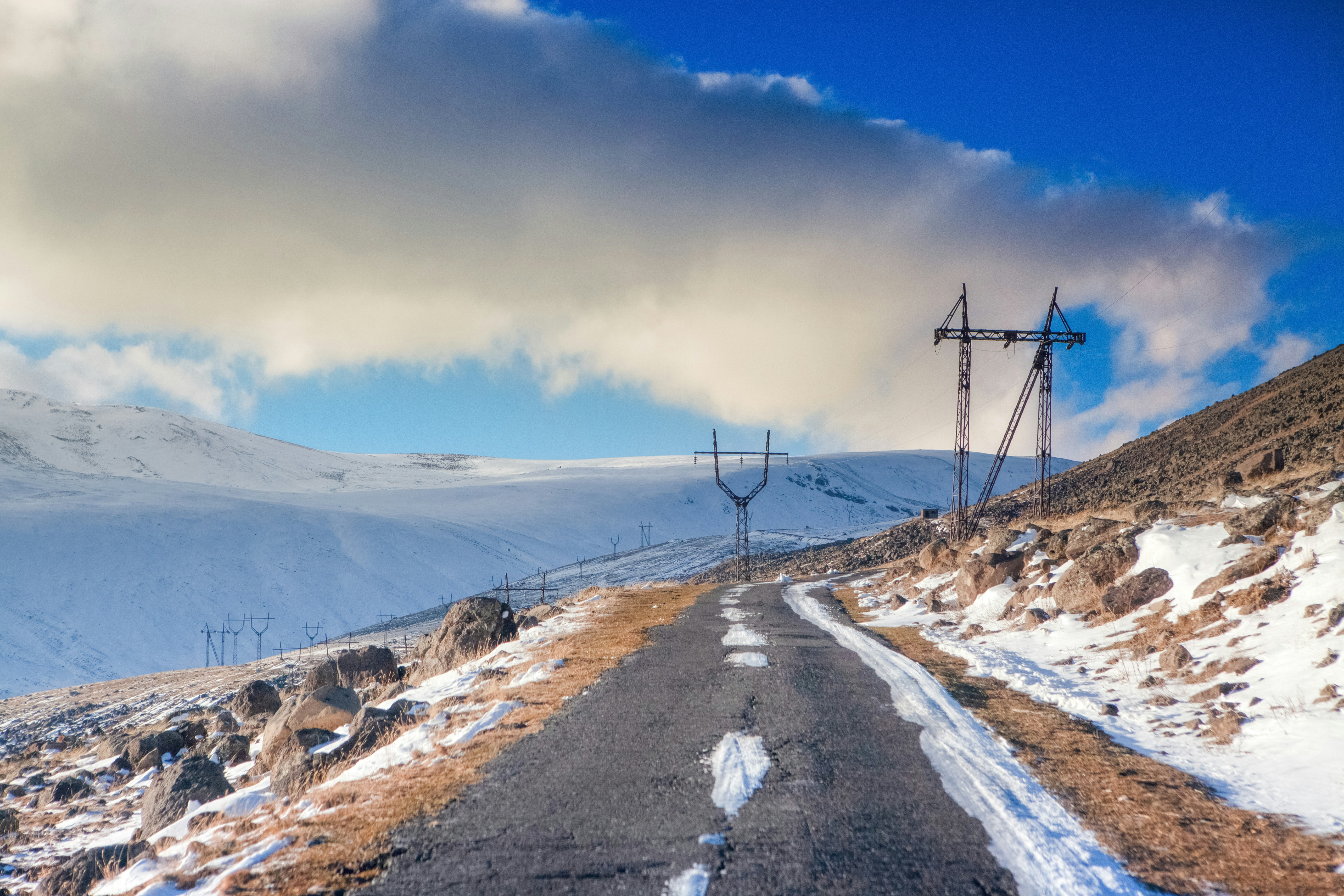 Snow-Pelted Road to the Distant Peak