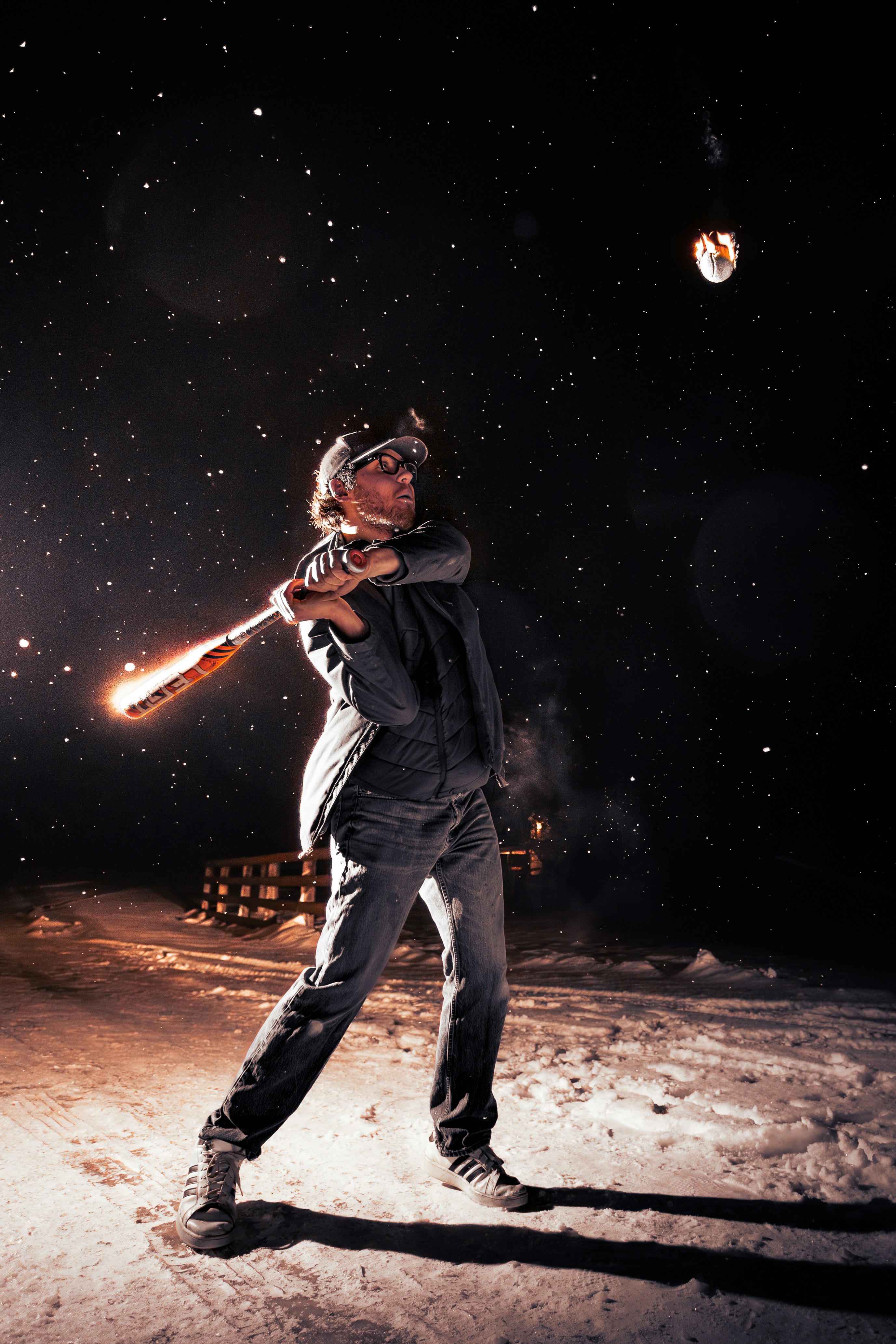 Snowbound Baton: Night Firelight and the Swinging Spark
