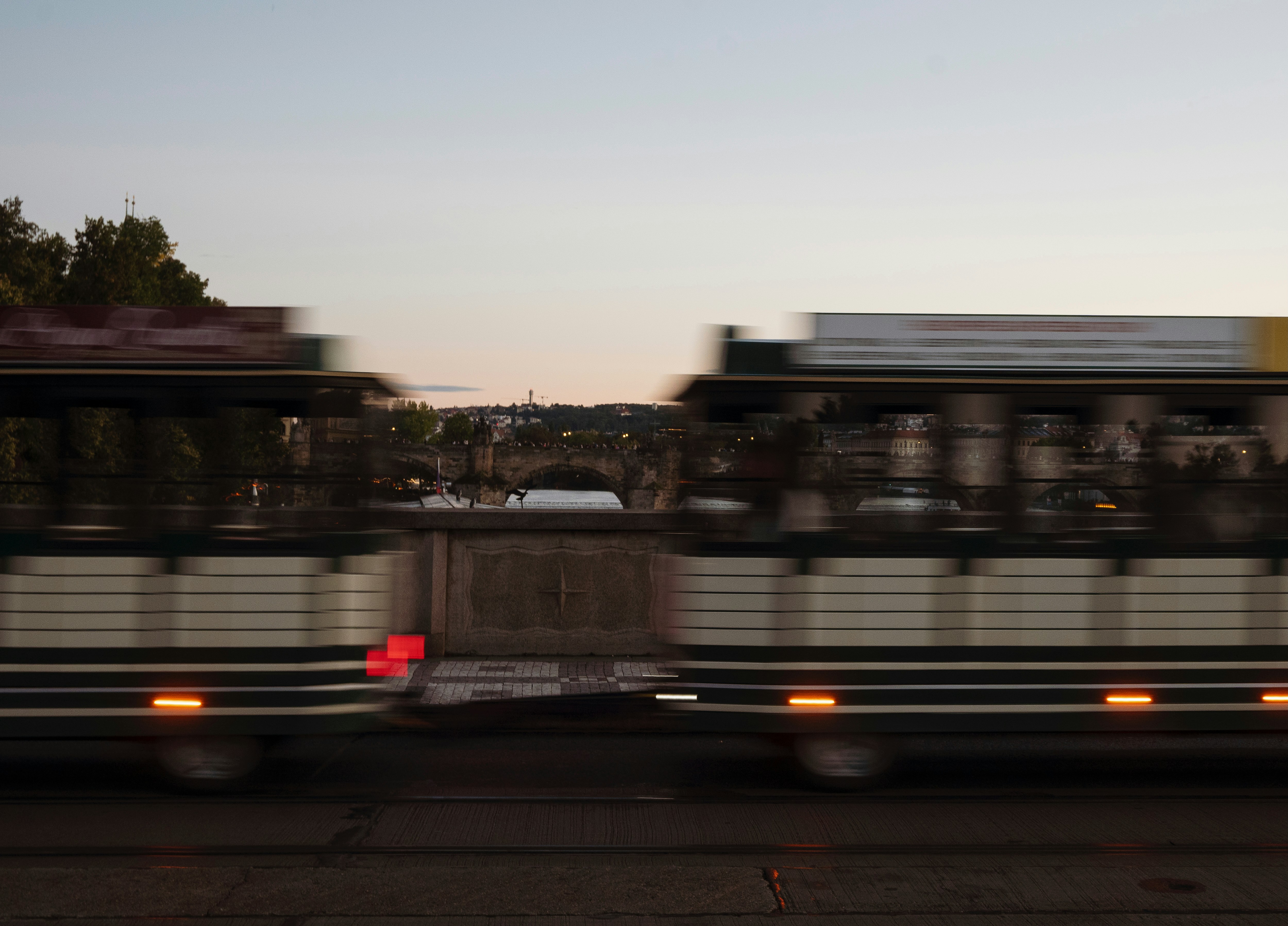 Blurry Railcars at Dusk: Transit in Motion