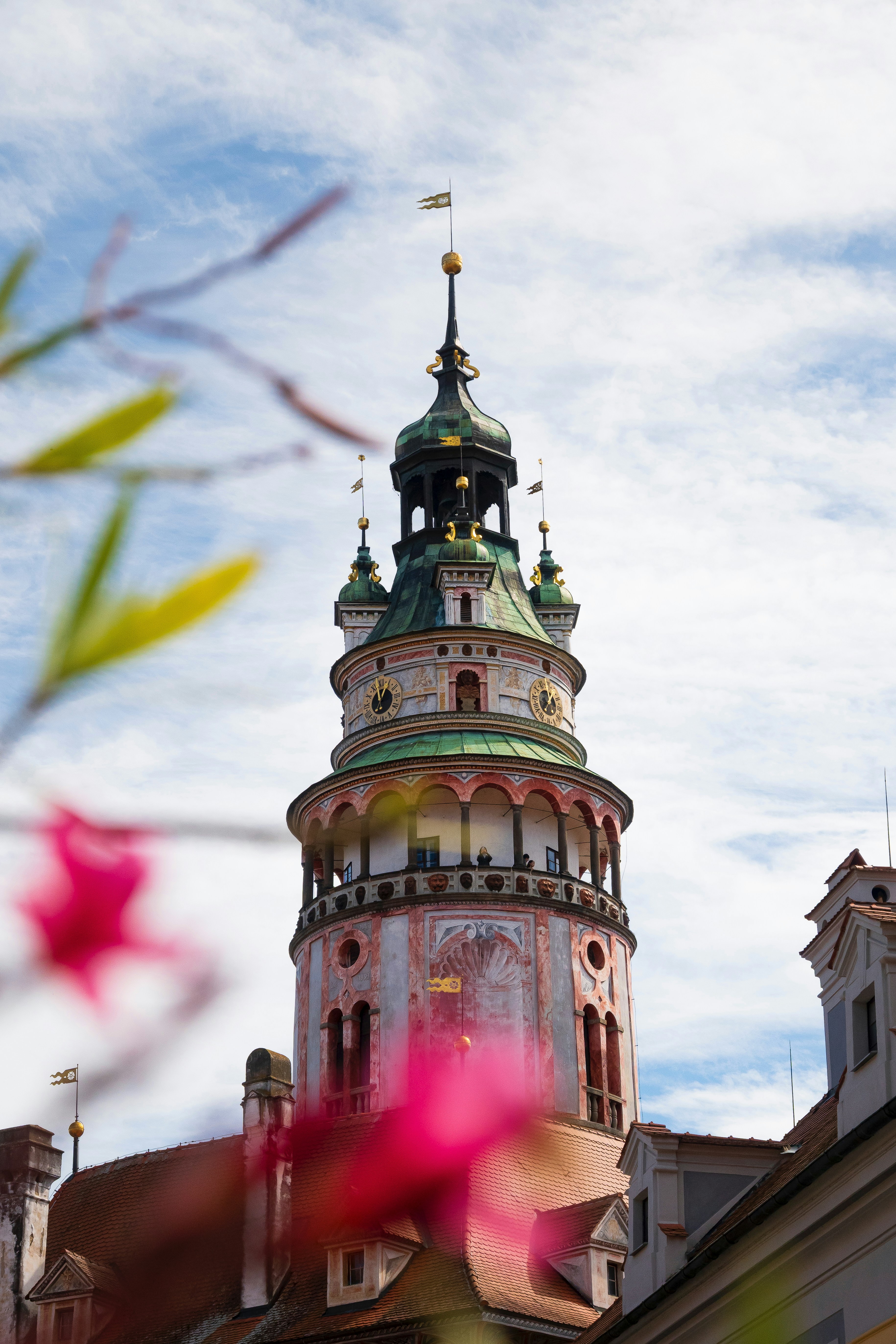 Towering Baroque Spire Rising Above a Faded Facade