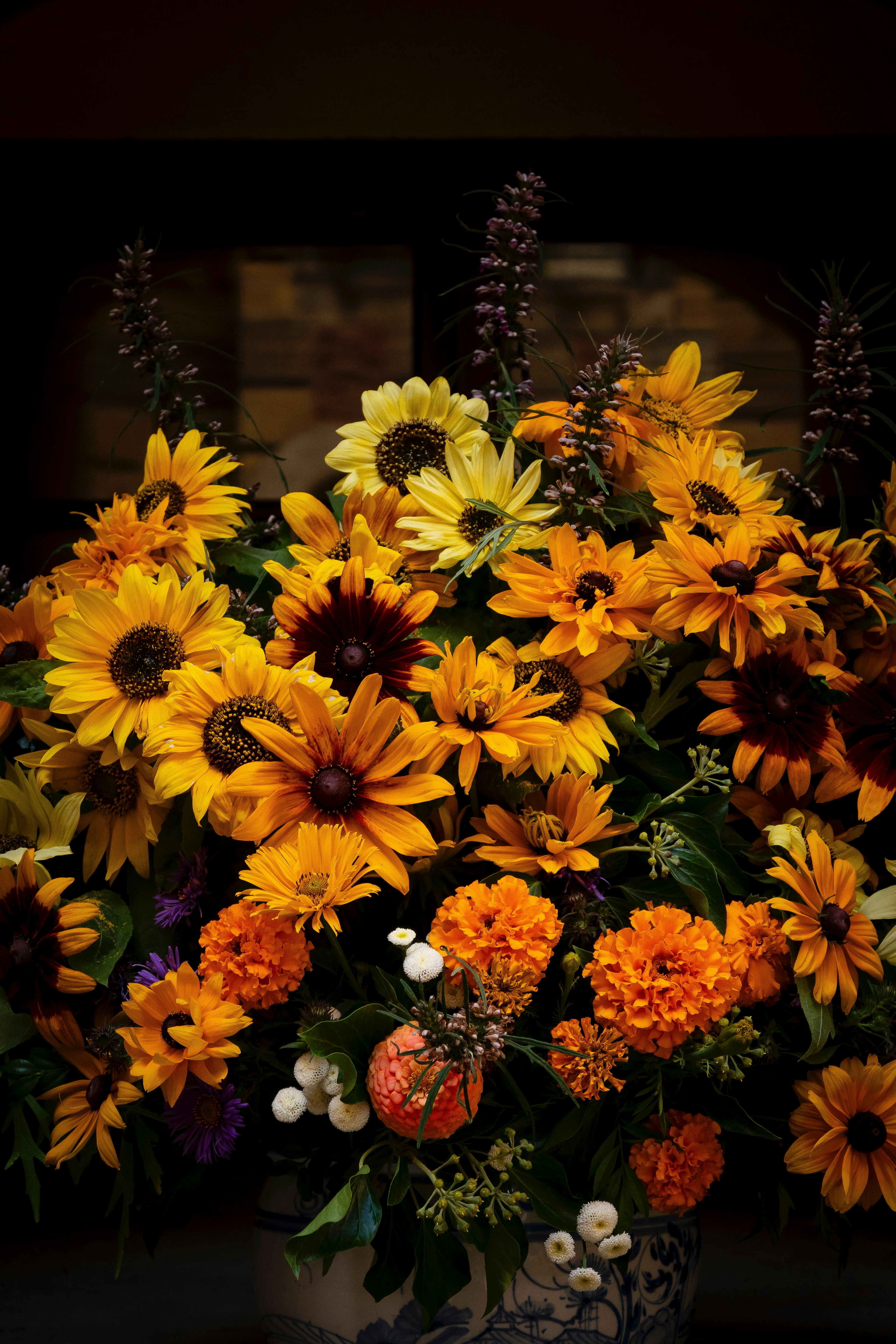 Sunlit Burst: A Flourish of Golden Blooms in Twilight Dark