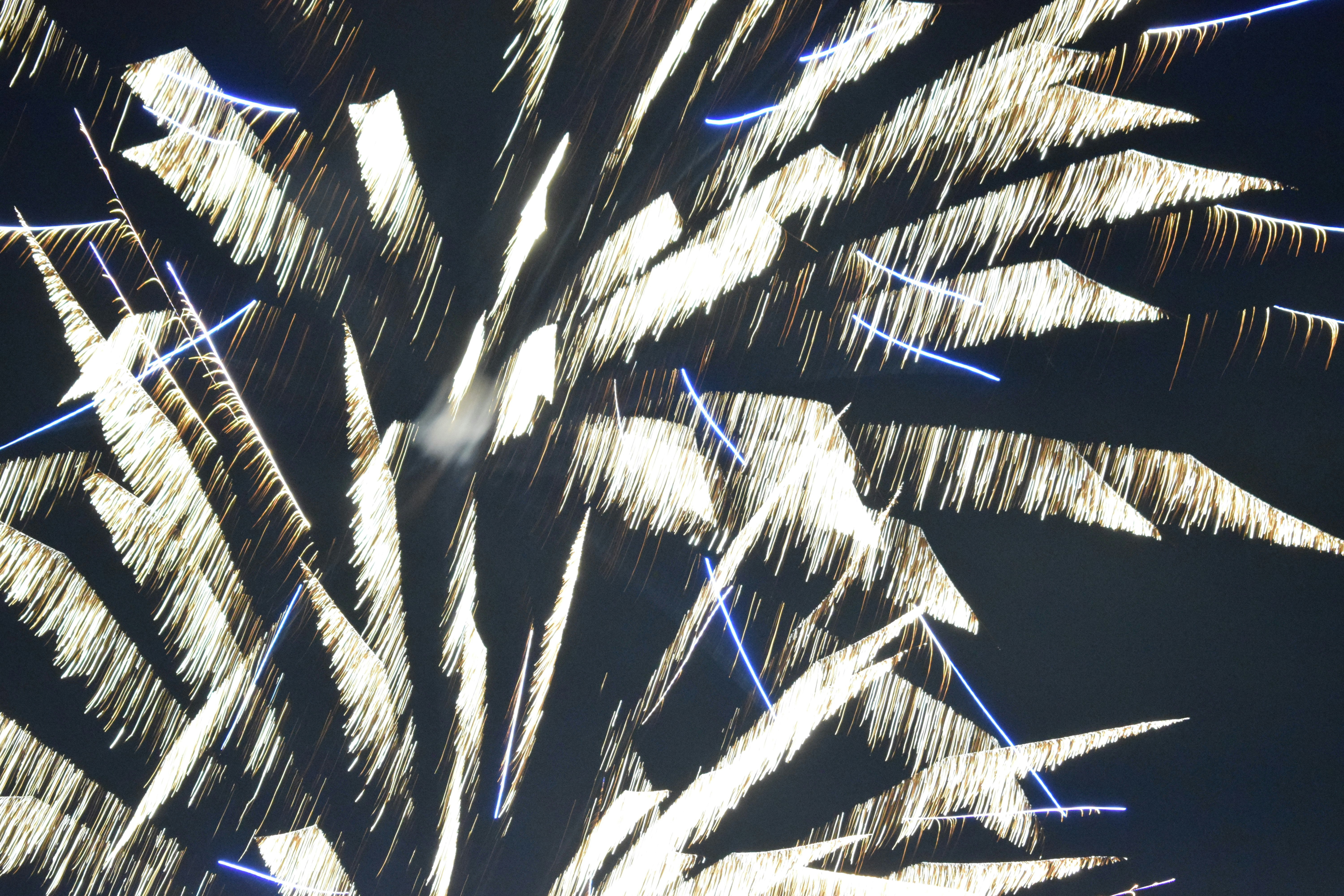 Blue-tinged Sparks Painting the Night Sky