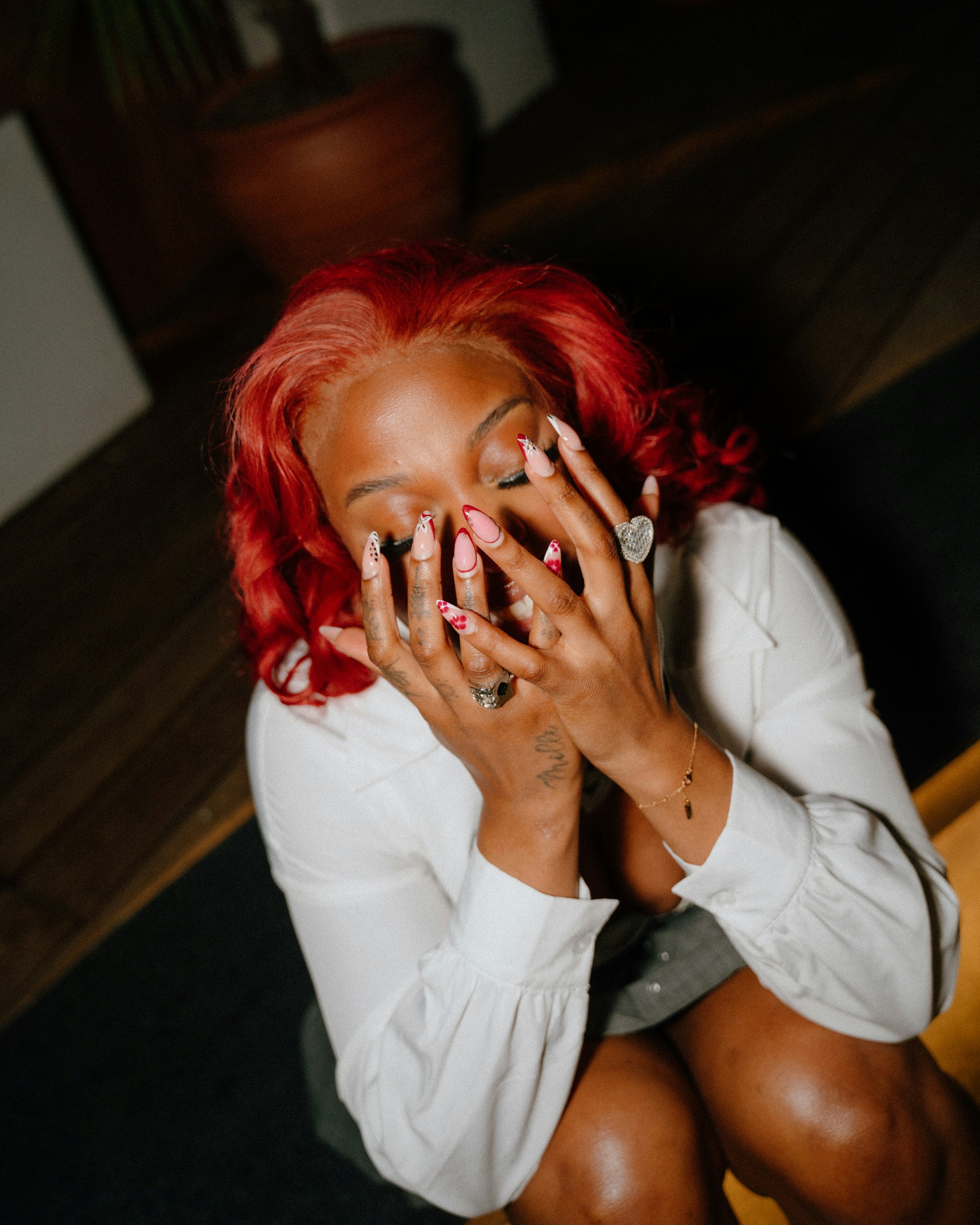 Red Crown: A Hidden Smile Behind Hands