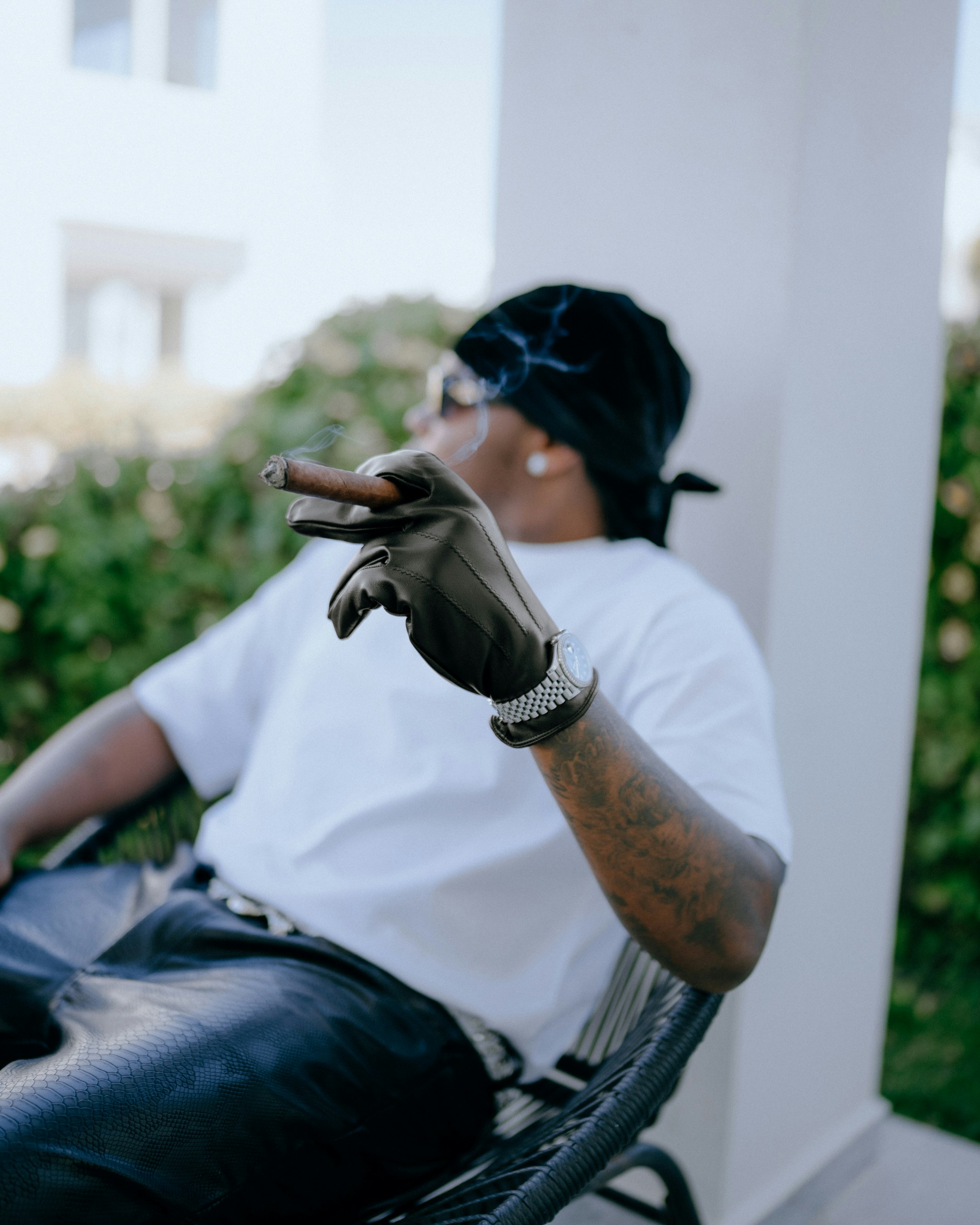 Cigar Glow: A Relaxed Pose on the Porch