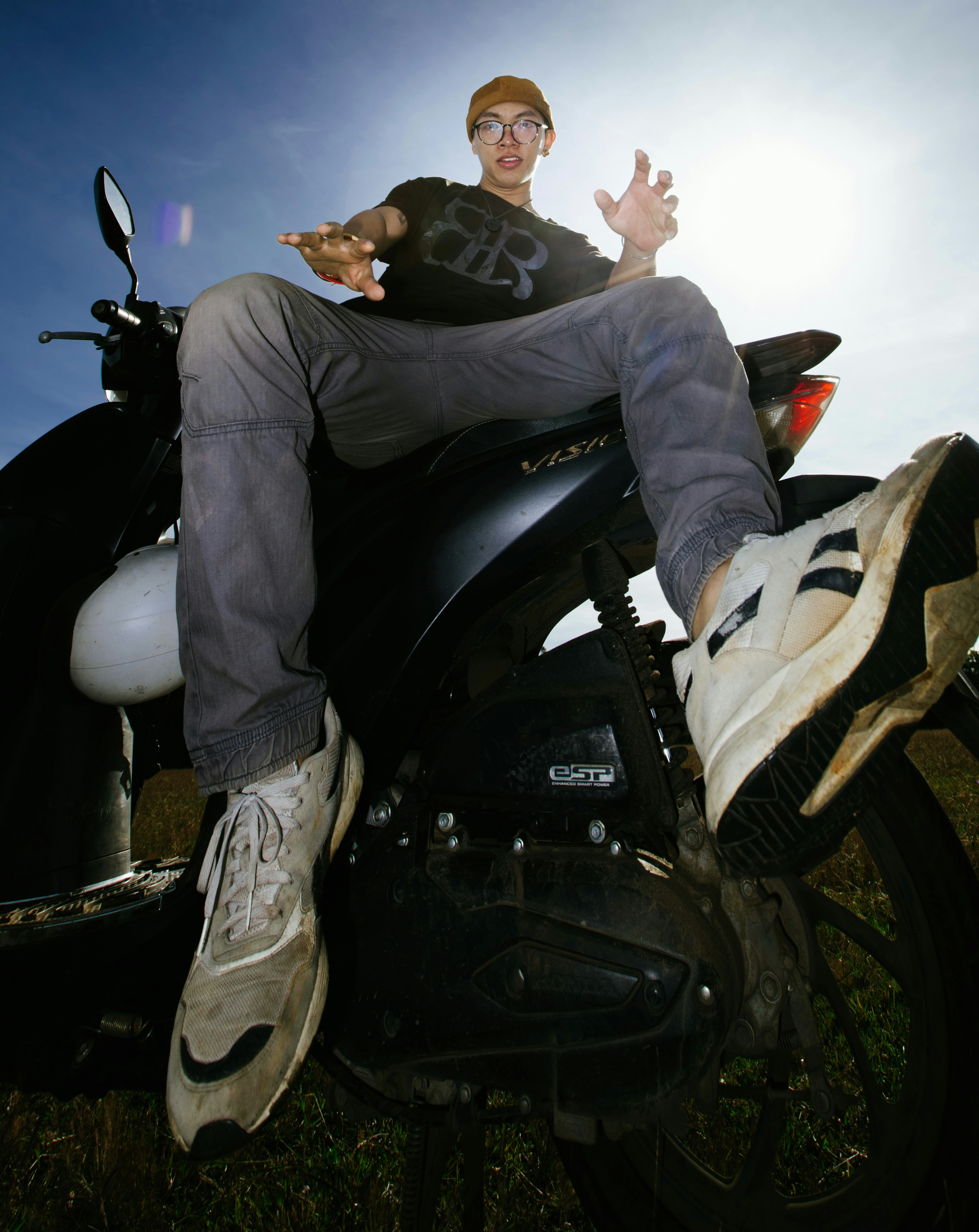 Biker's Low-Angle Leap: Confidence Over the Seat
