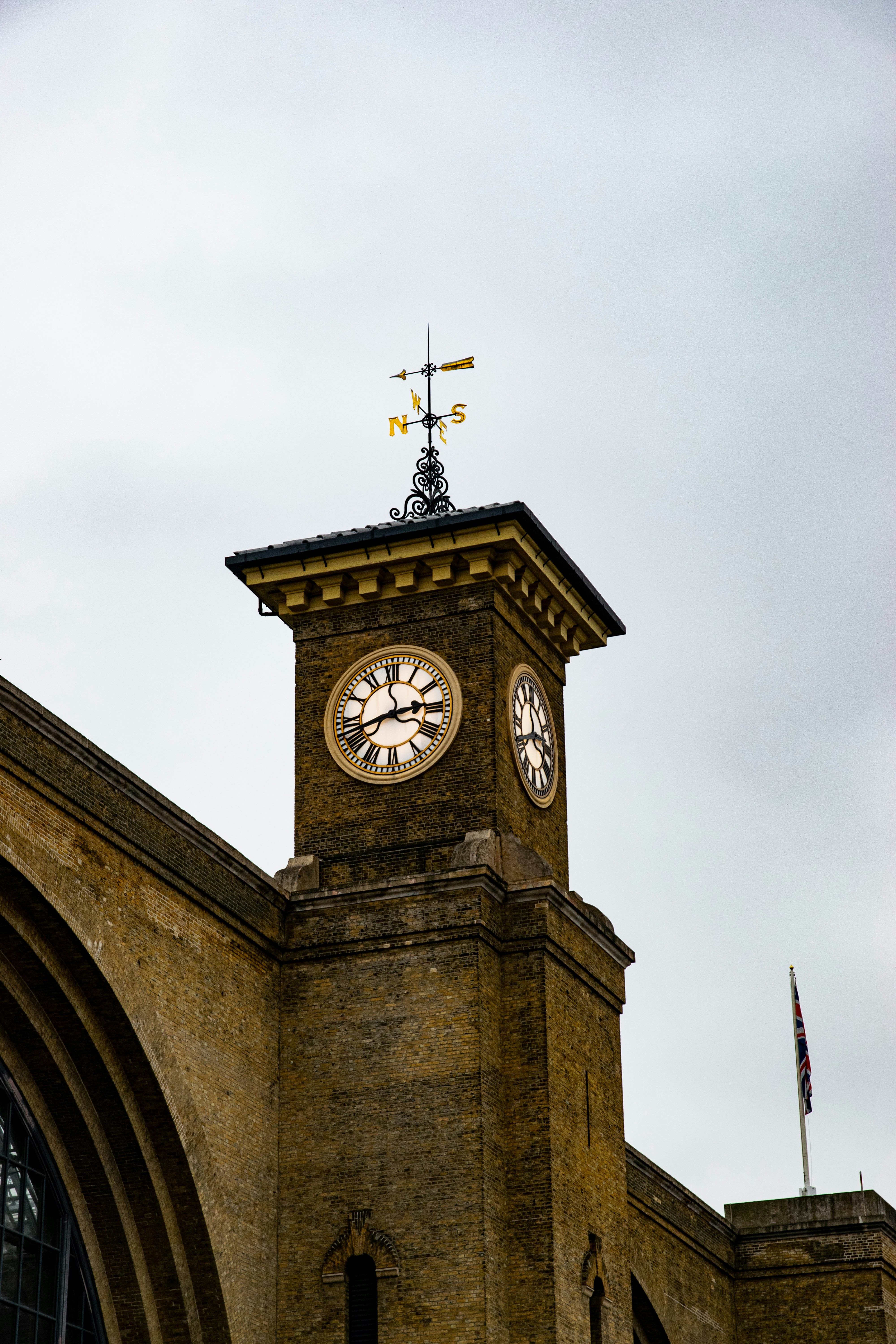 Timekeeper Tower: A Brick Clock Faces the Open Sky