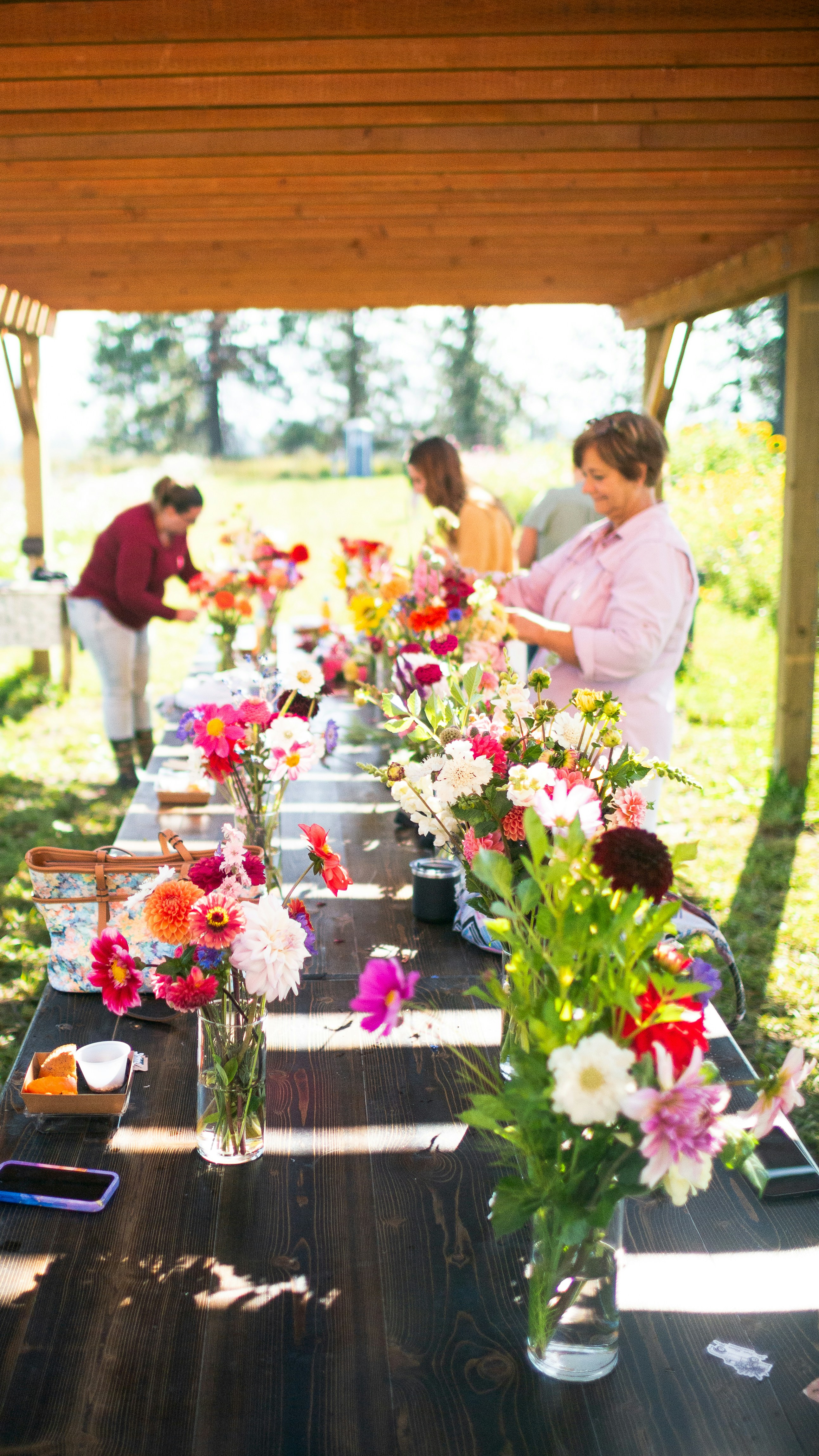 Floral Assembly Under a Shaded Pavilion