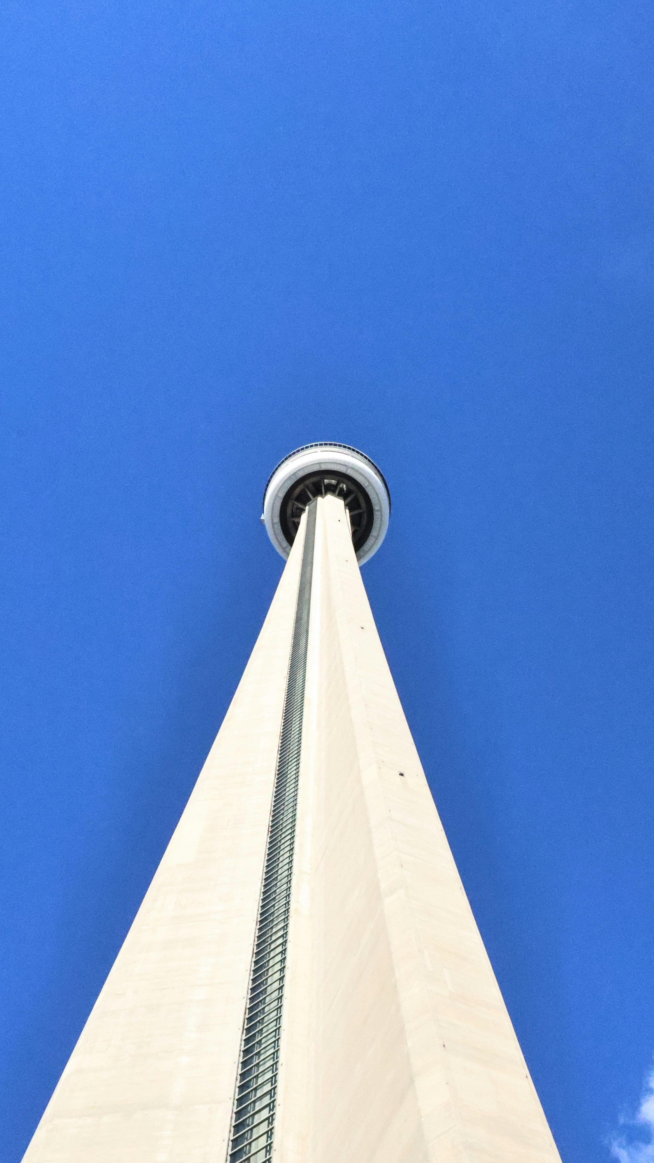 Upward Gaze: The Spire Reaches into a Clear Blue