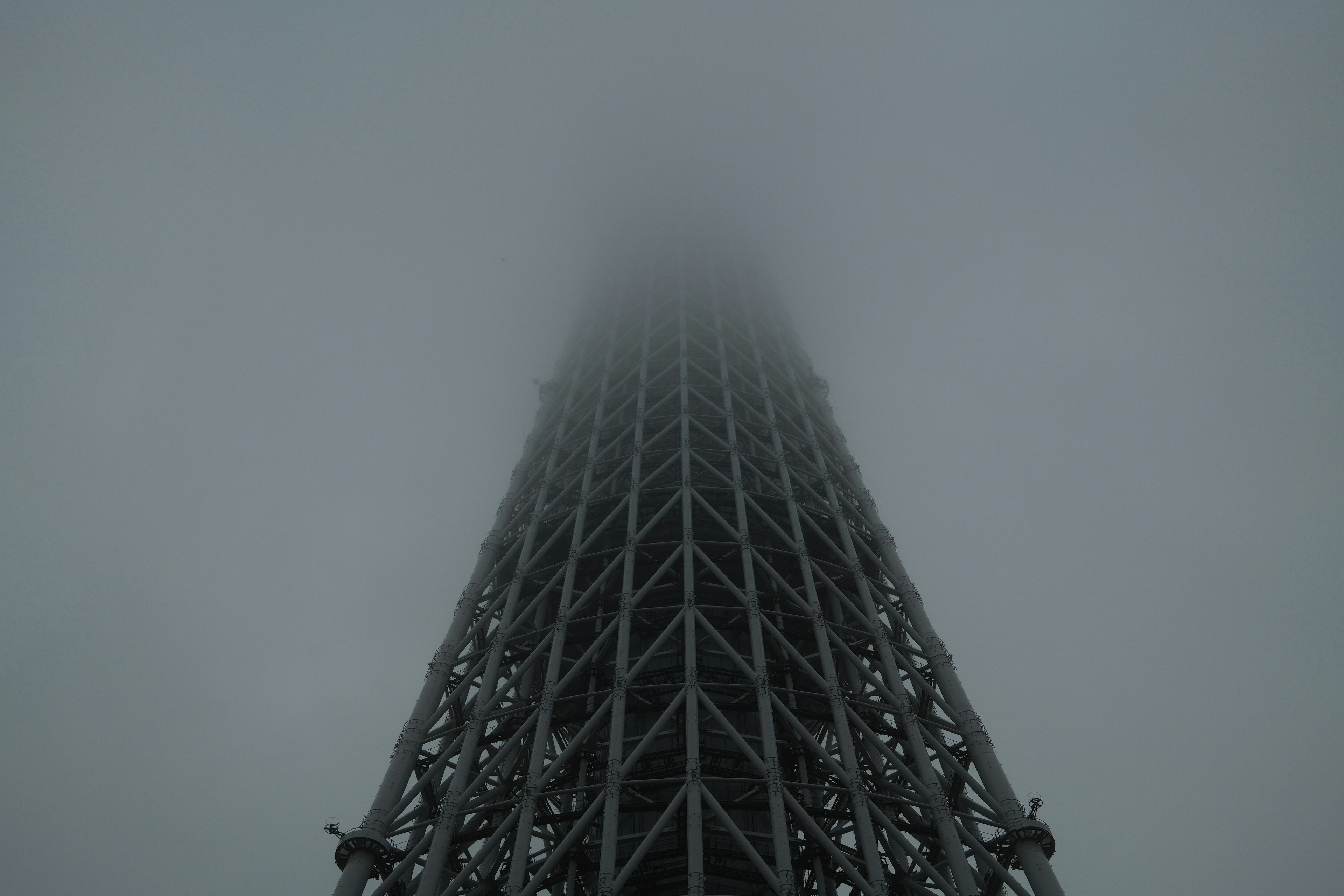Towering Truss Reaching into the Low Clouds