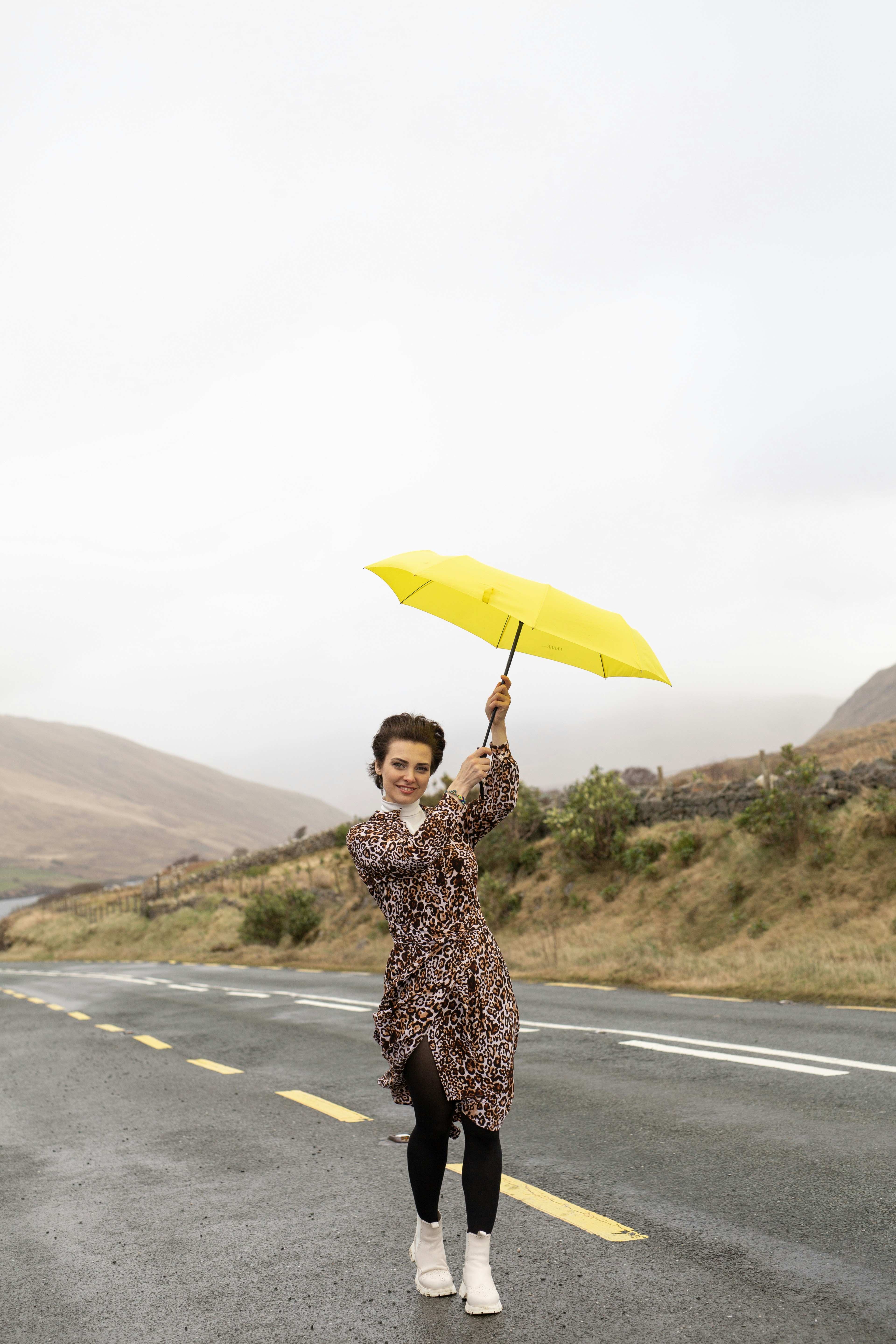 Yellow Umbrella on a Lonesome Road