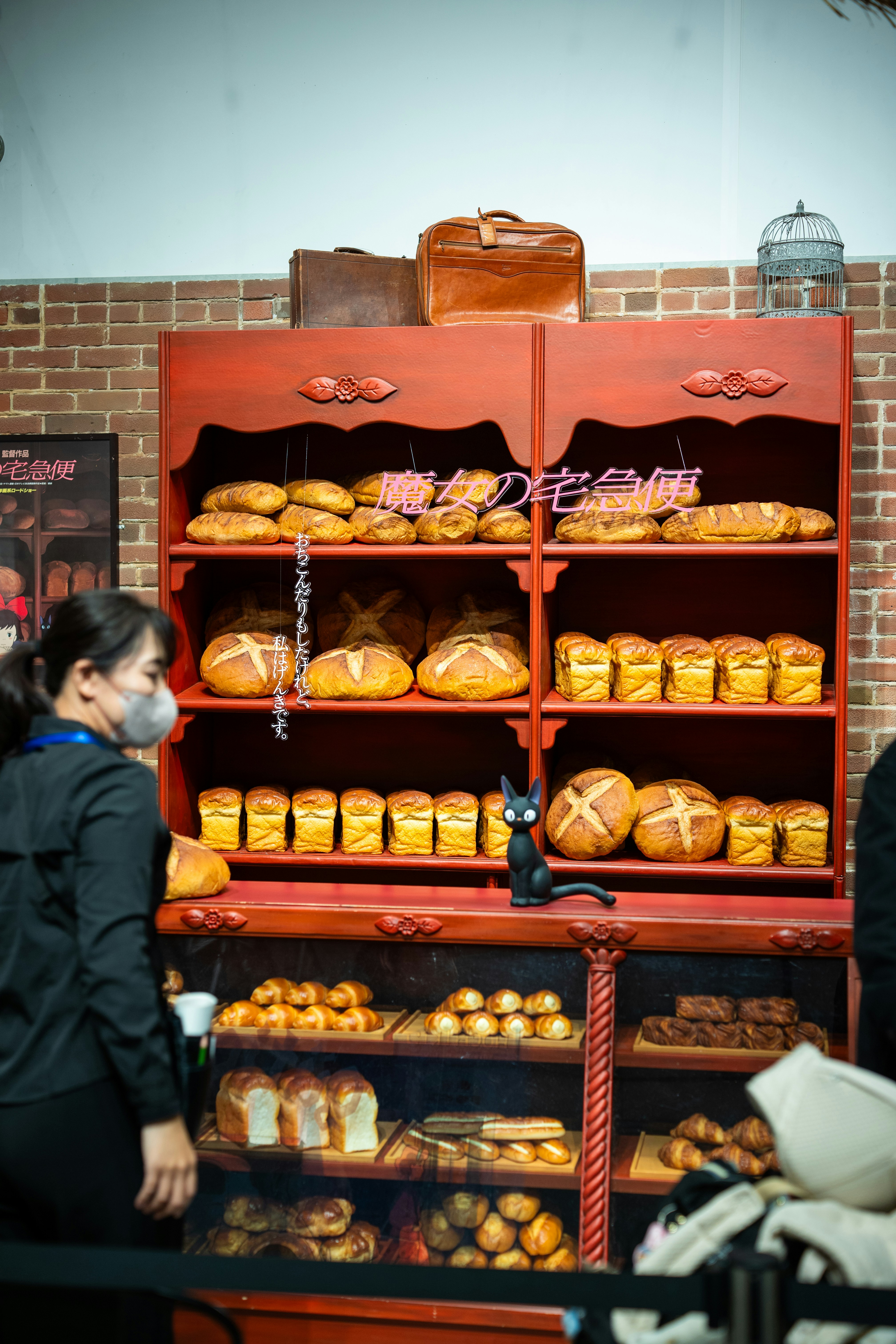 Loaves on Display: A Bakery Carousel in Red Shelves