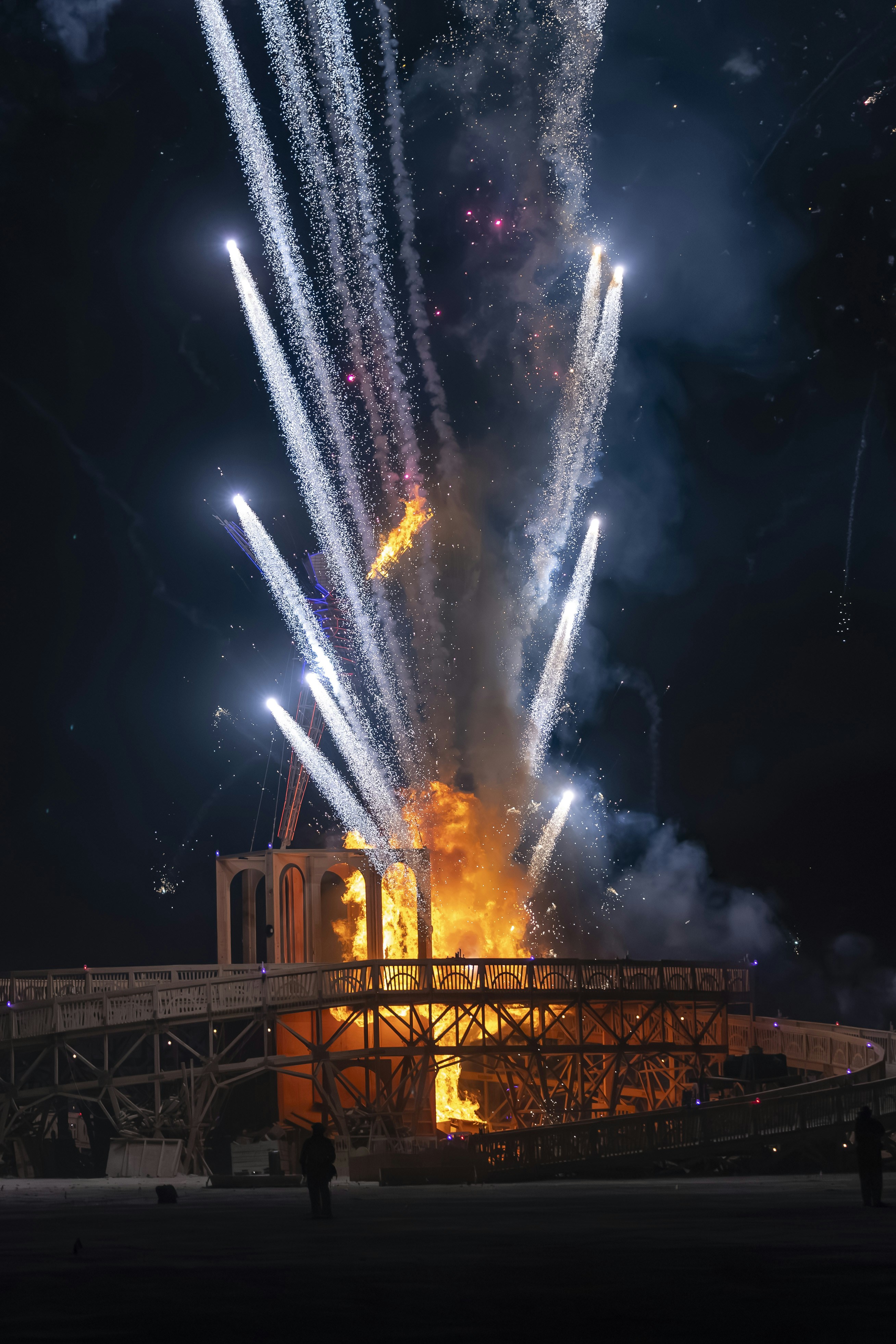 Inferno on the Pier: Fireworks Crown the Night at a Structural Arc