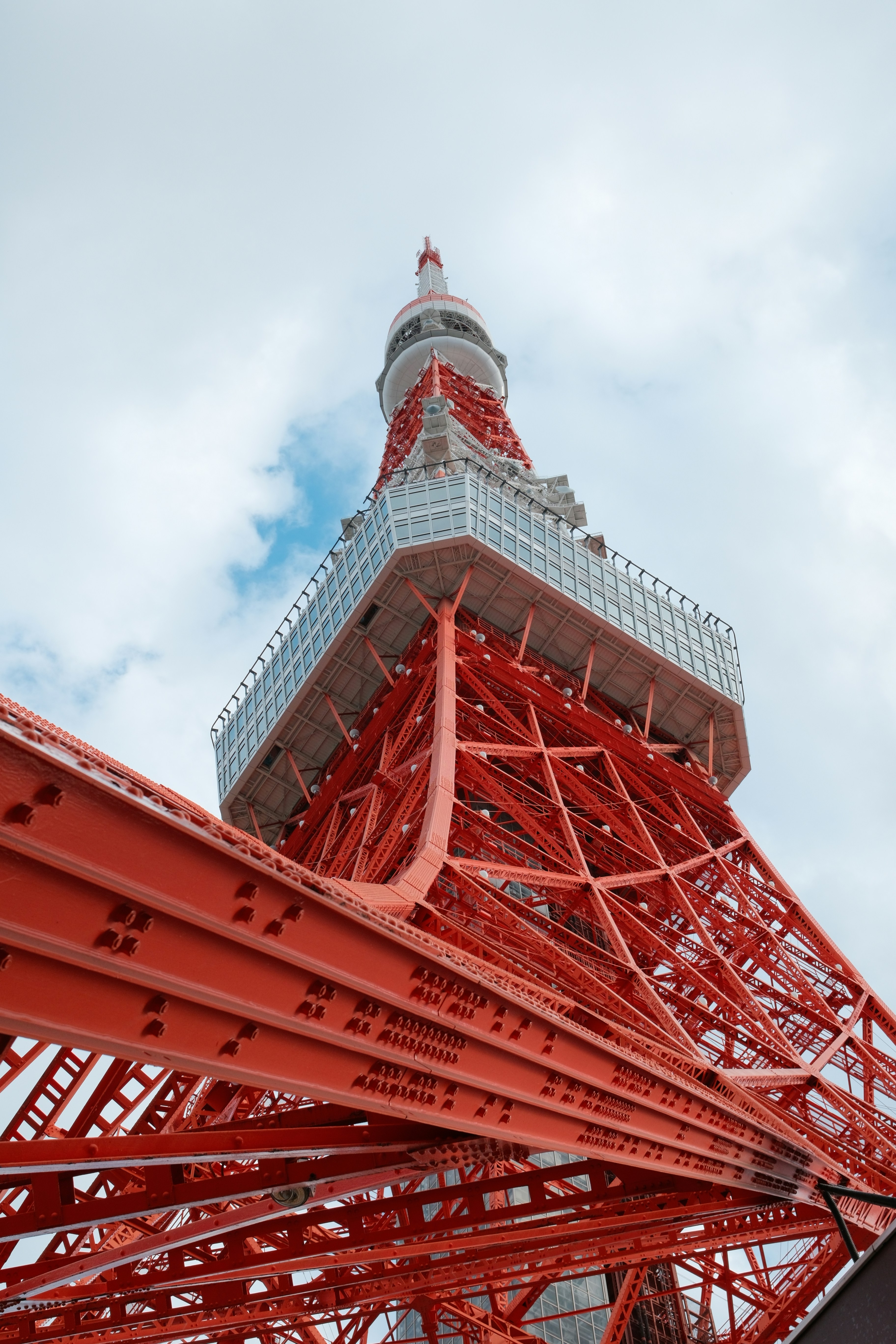 Red Iron Sentinel: Tokyo Tower Ascends into a Wind-Swept Sky