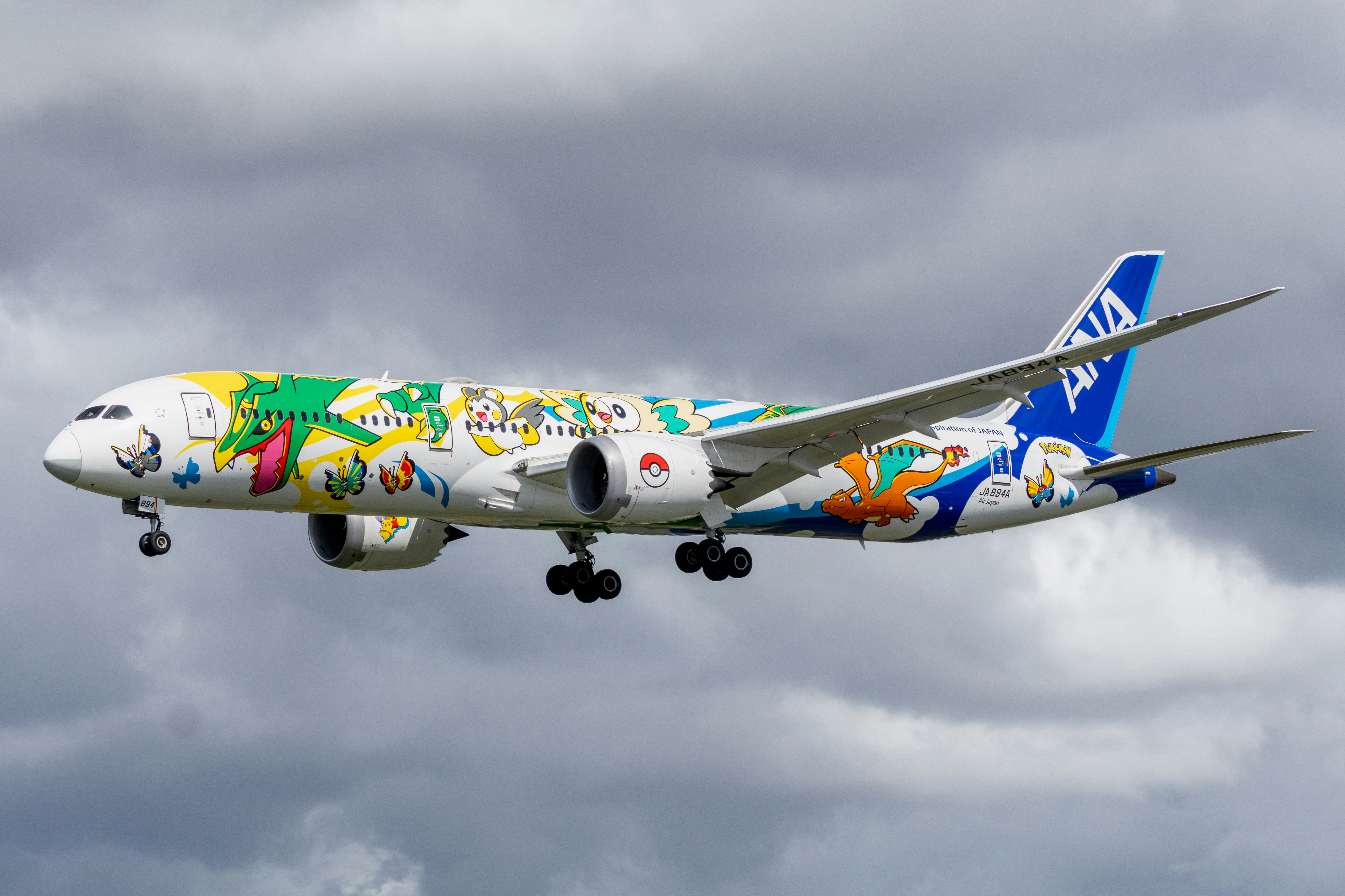 Colorful tailwind: a vibrant promotional jet in flight