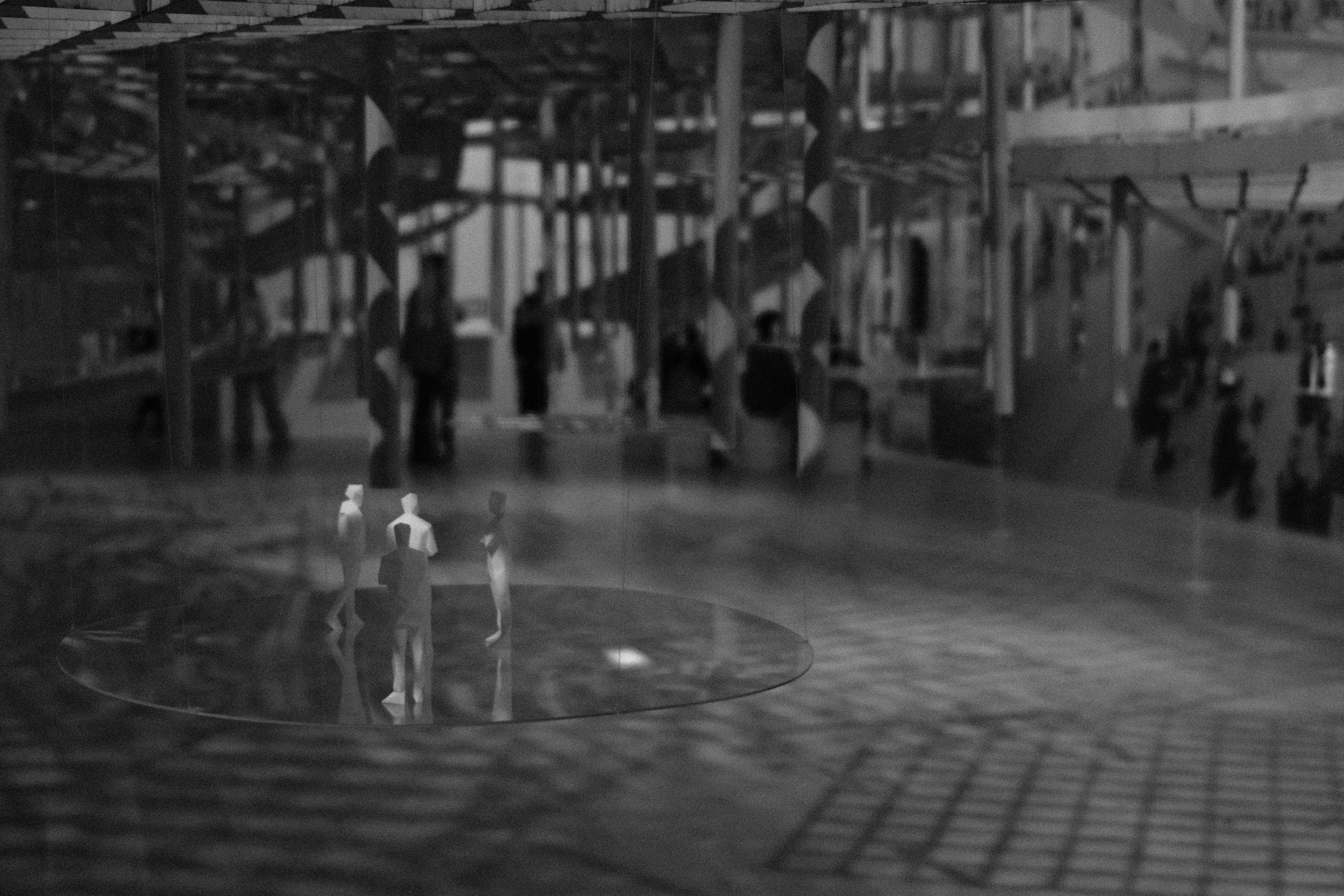Dawn Circle: Figures in a Quiet Atrium