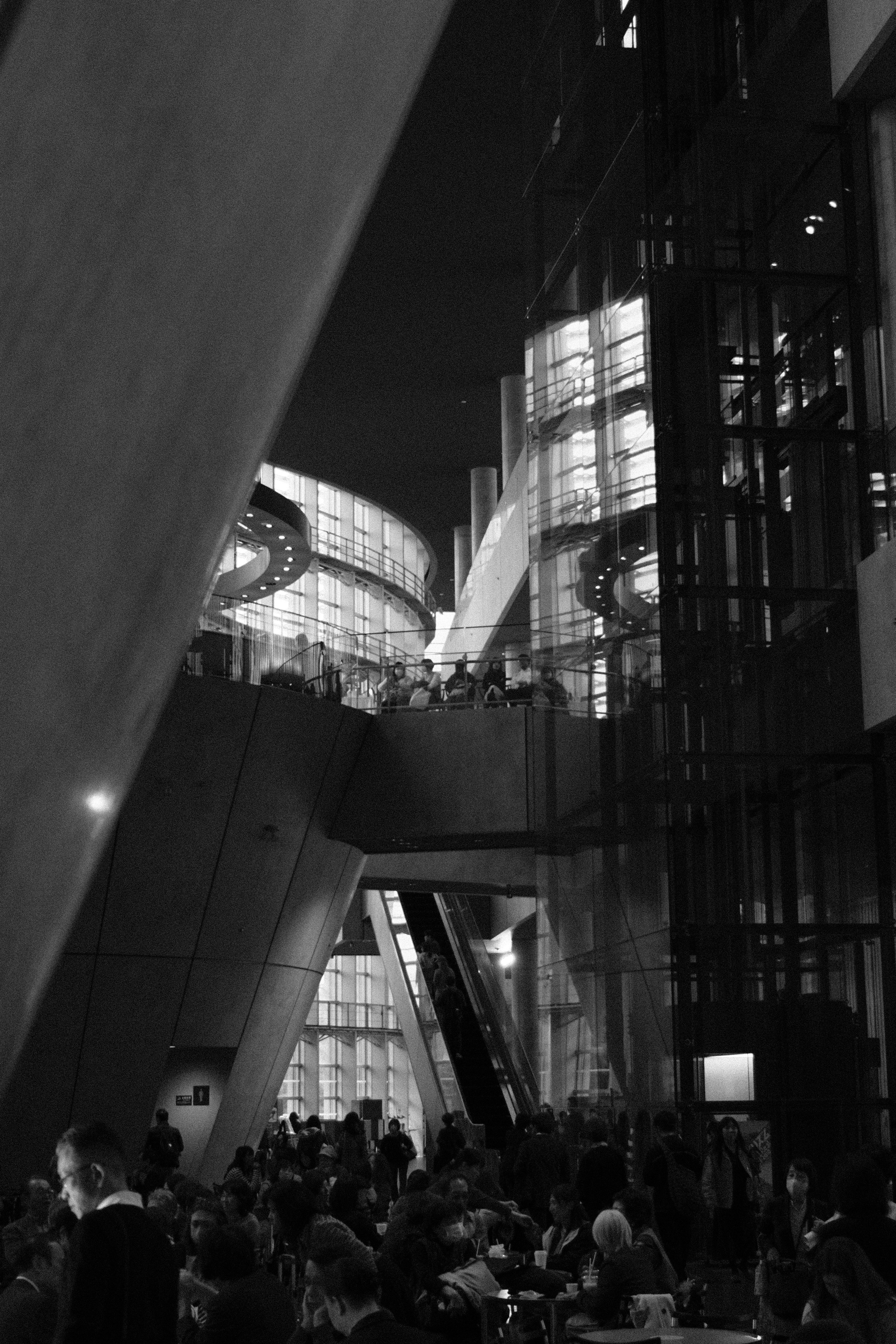 Urban Cathedral: Nightlife Within a Glass-Encased Atrium