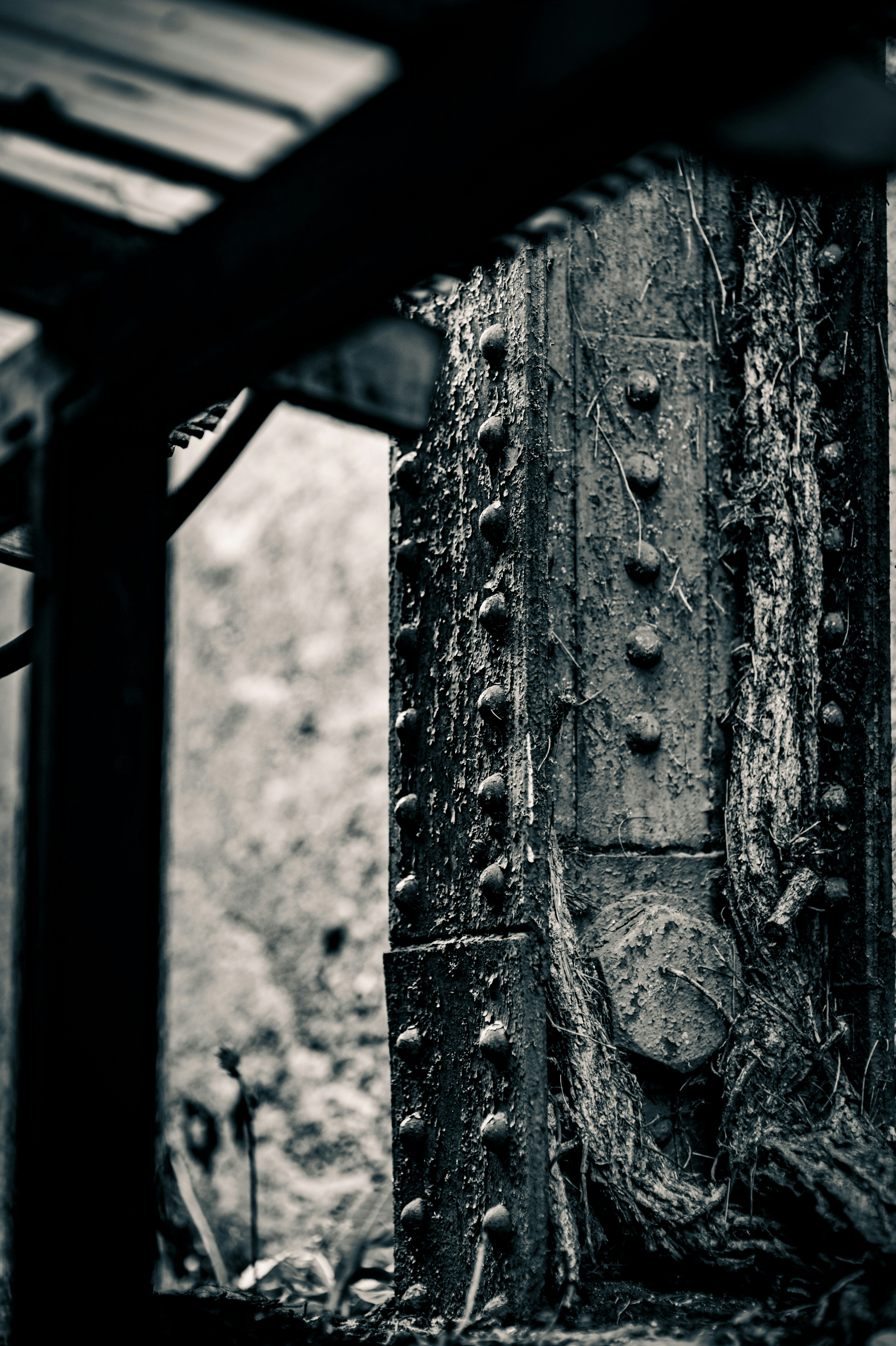 Rusted Gatepost in Quiet Decay