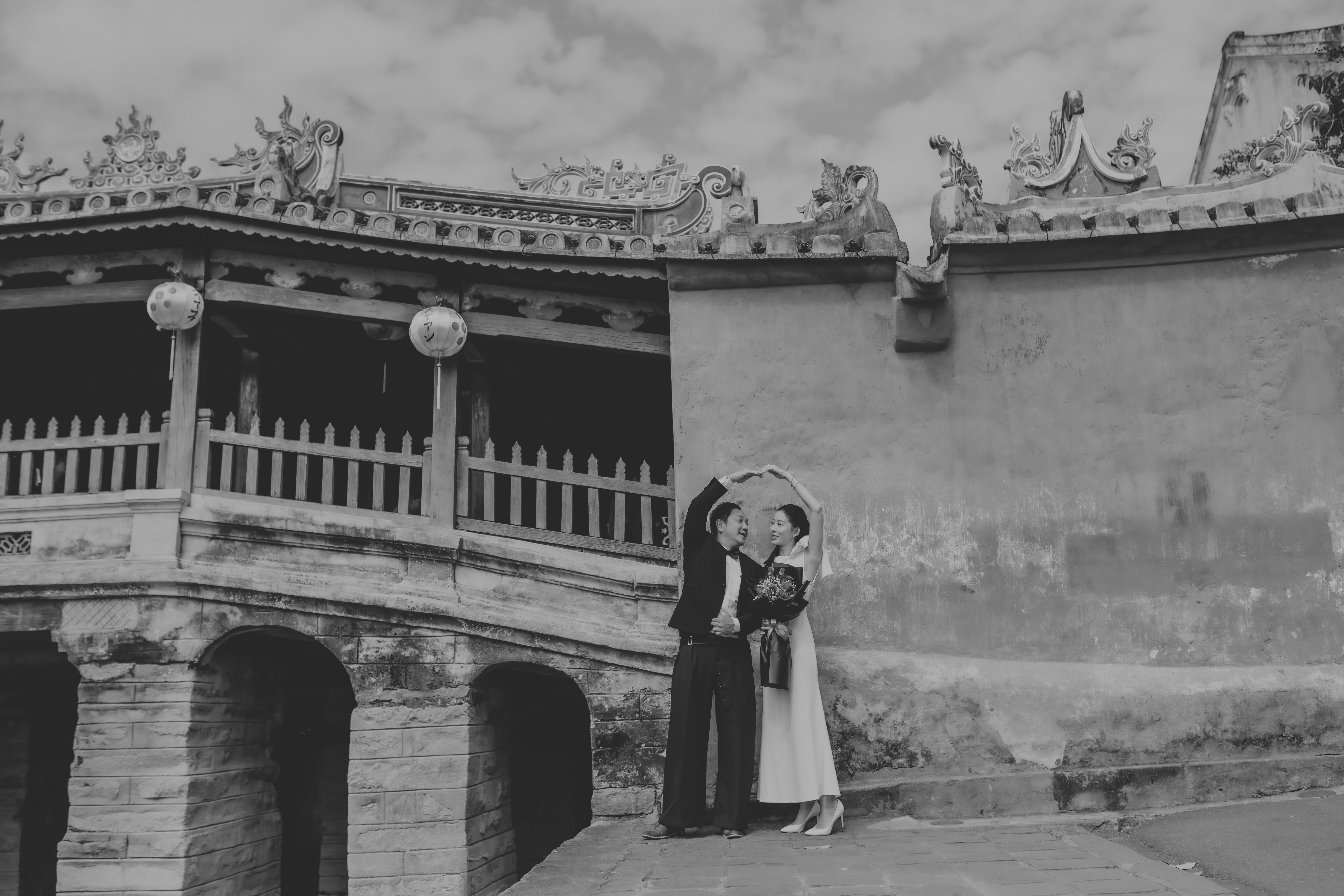 Couple at the edge of history: a quiet vow beside ancient walls